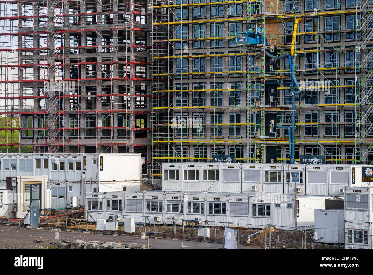 Large construction site, scaffolded shell of an office building complex ...