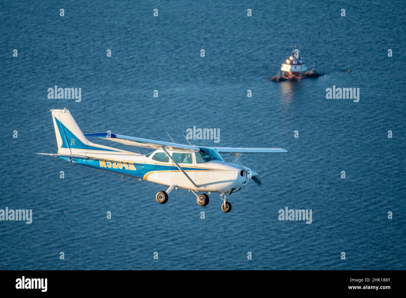 A cessna 172 taking a sunset flight over Annapolis Stock Photo - Alamy