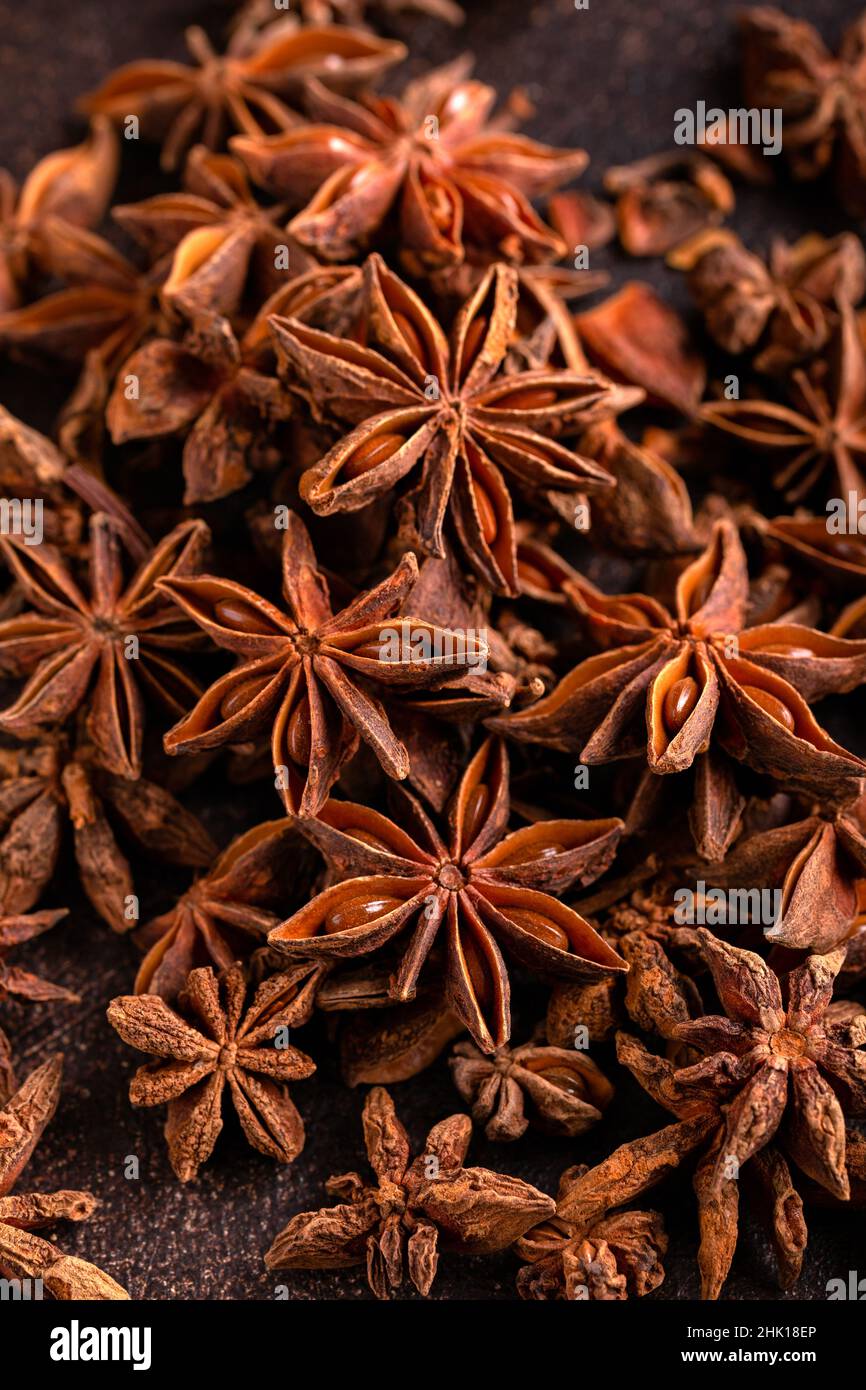 Anise stars herbs on rustic old table Stock Photo - Alamy