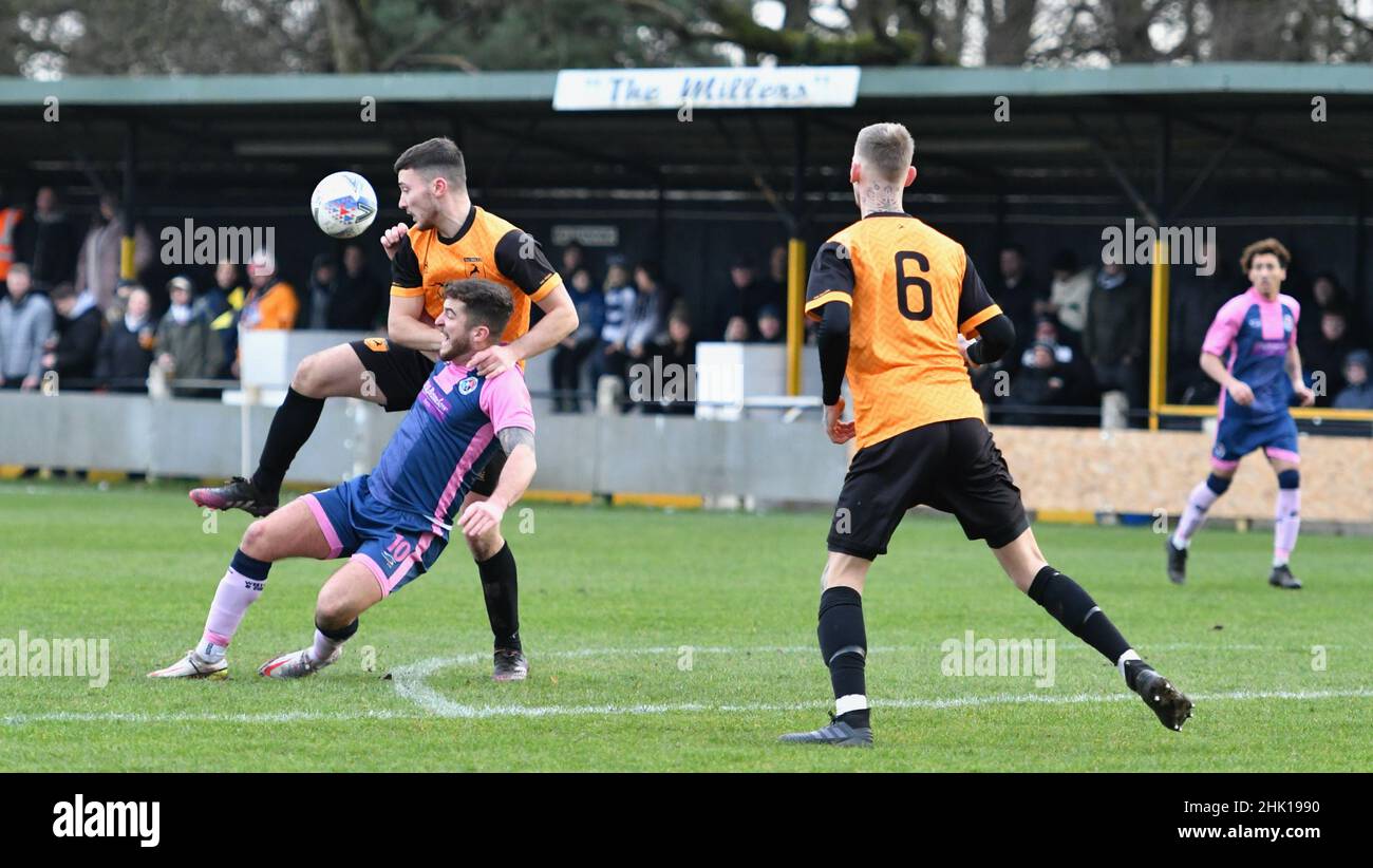 Football action in the match between New Mills and West Didsbury and ...