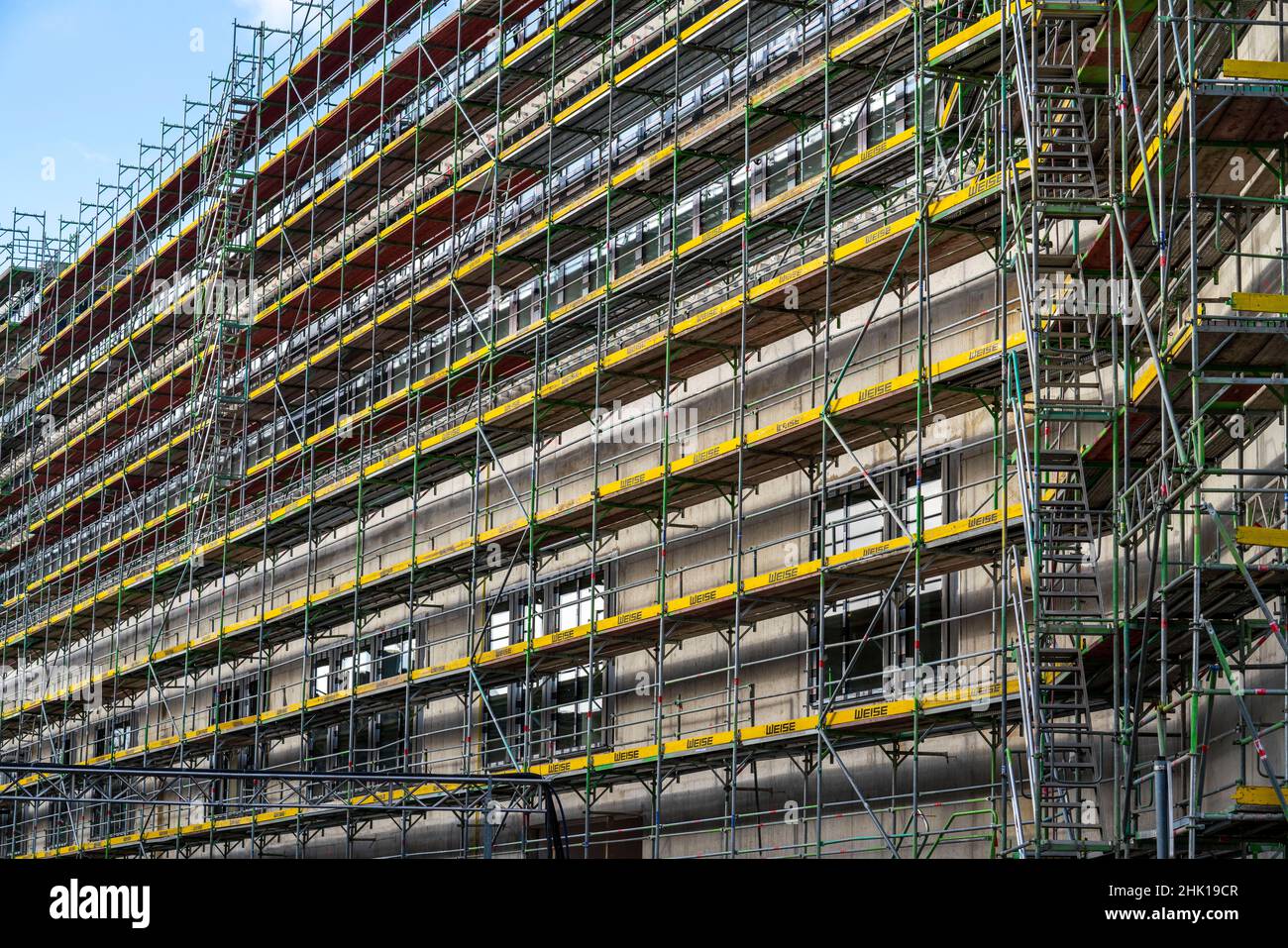 Large construction site, scaffolded shell of an office and commercial ...