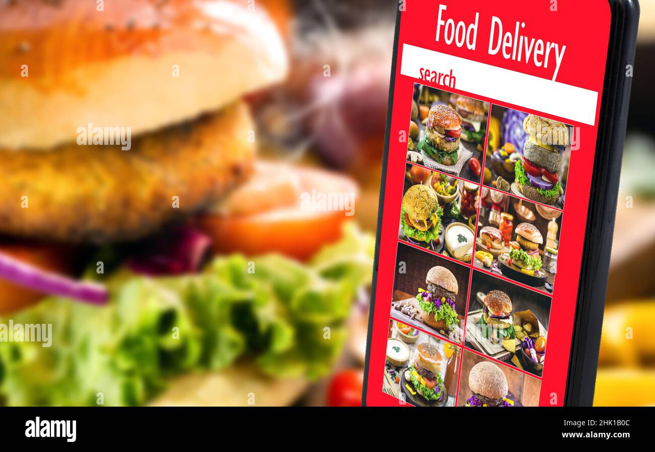 smartphone with food delivery app screen, online hamburger website ...