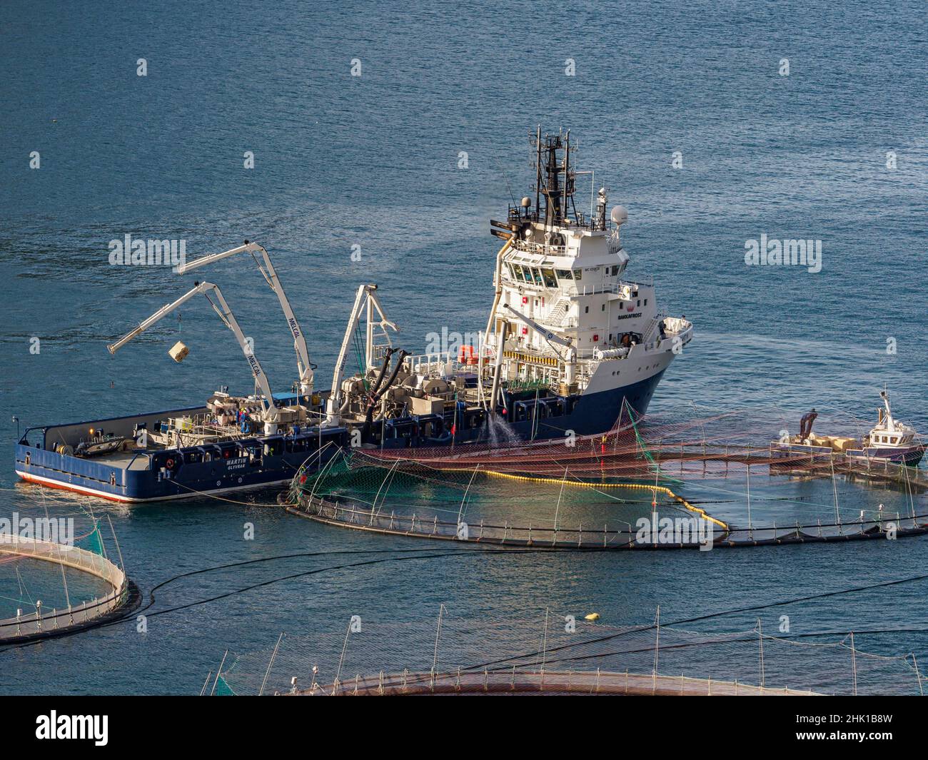 Faroe Islands, Denmark - Sep, 2020: Salmon farm, equipped with a ...
