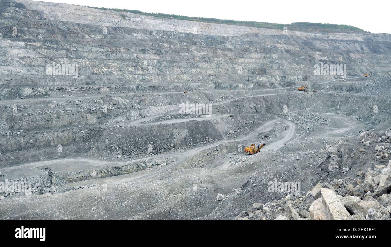 Open white quarry mining. Open pit with multi-way excavation of ...