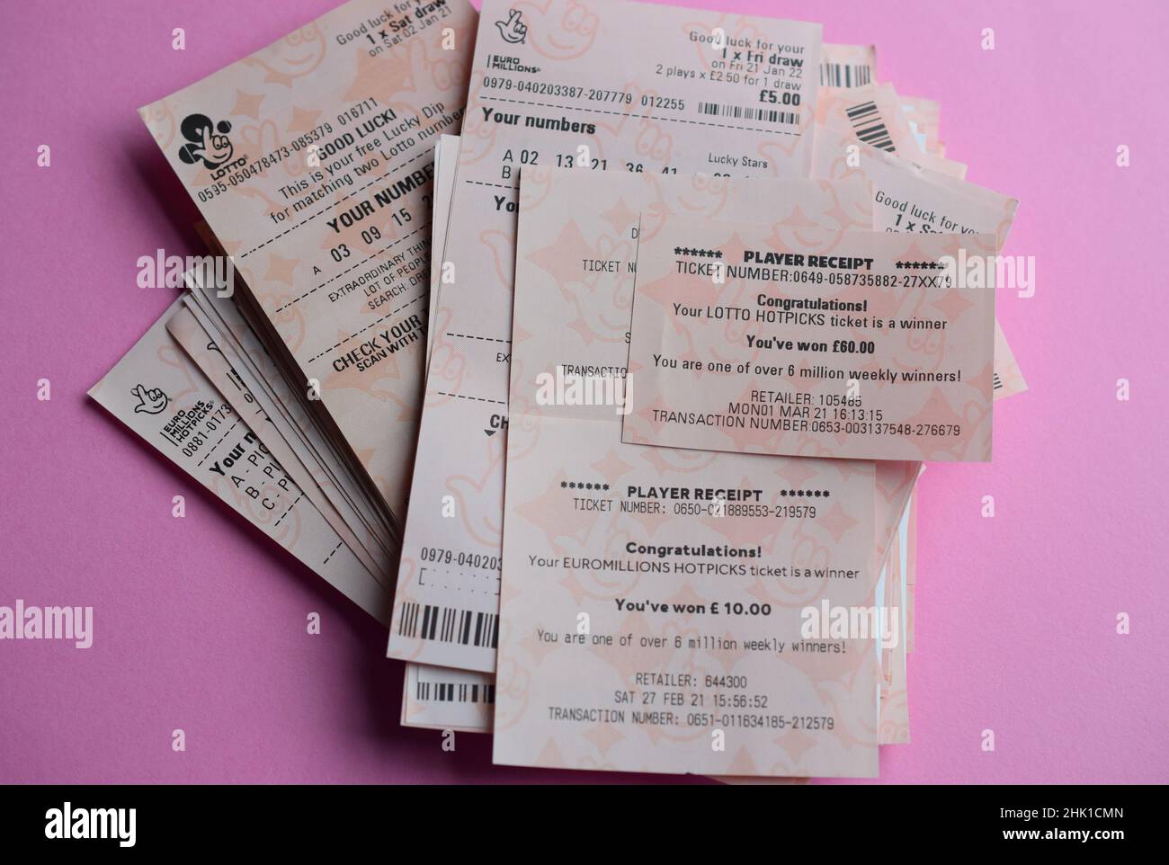 Pile of lottery tickets and winning receipts Stock Photo - Alamy