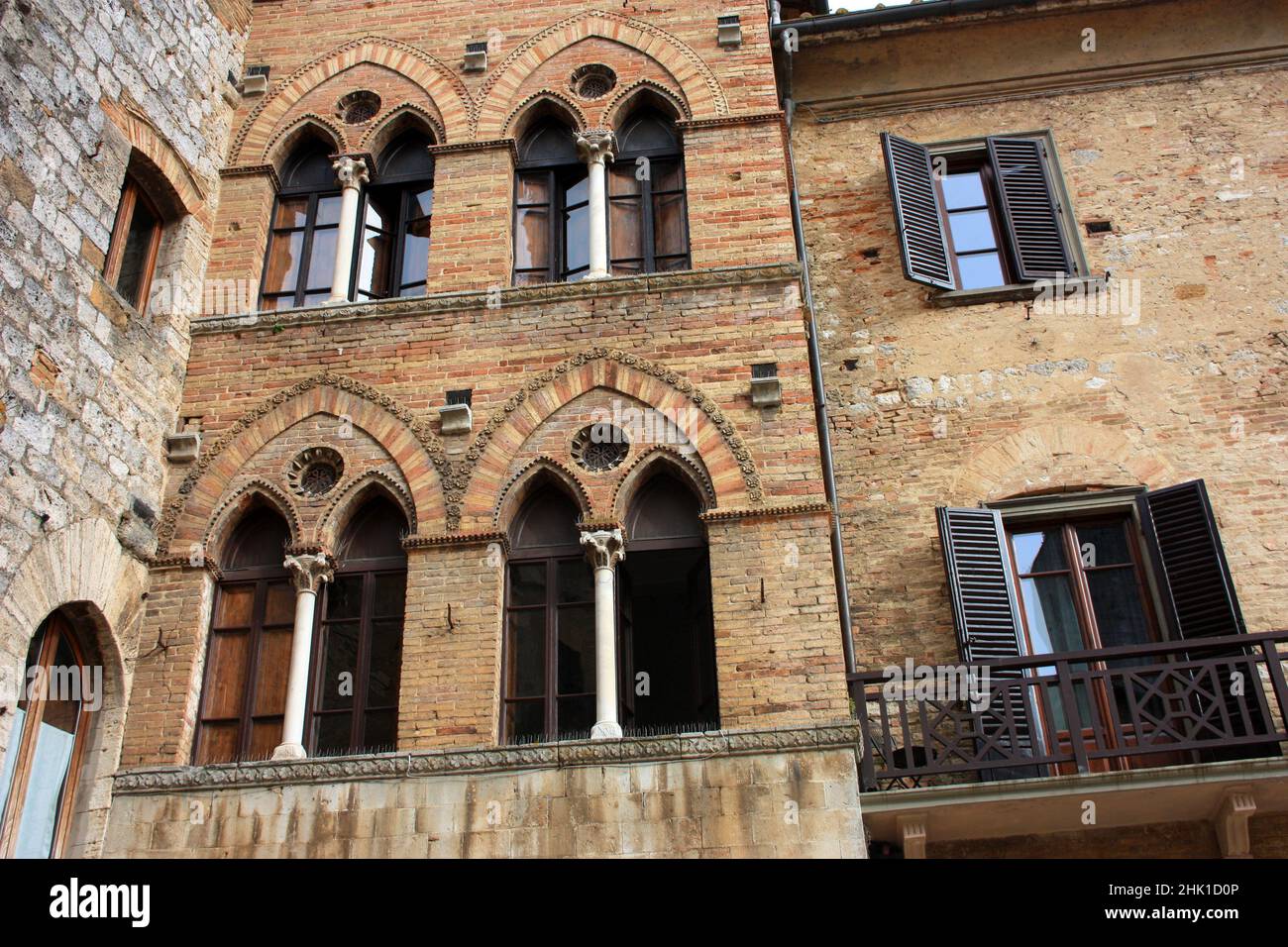 charming ancient brick walls of medieval structures in tuscan ...