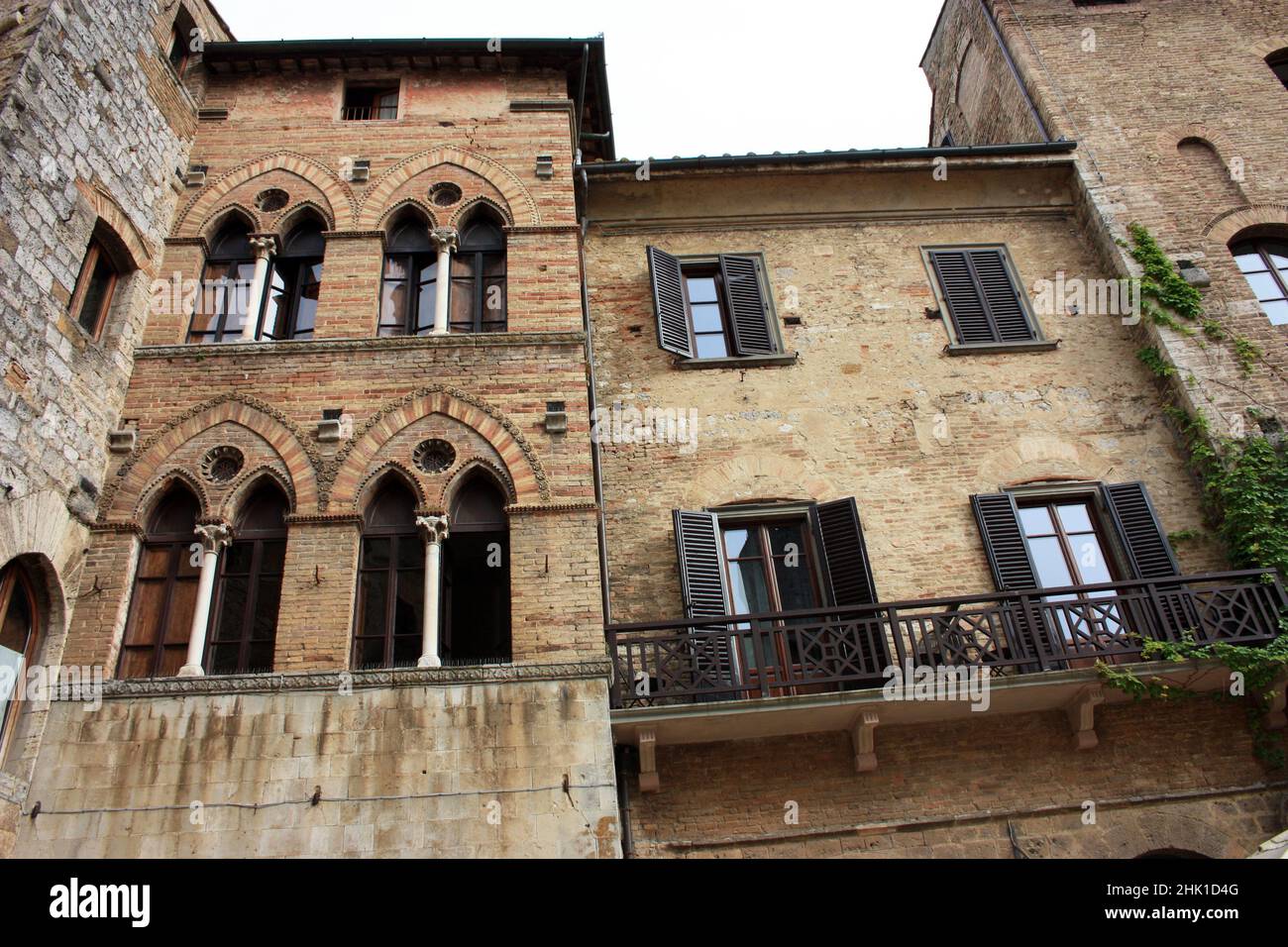 charming ancient brick walls of medieval structures in tuscan ...