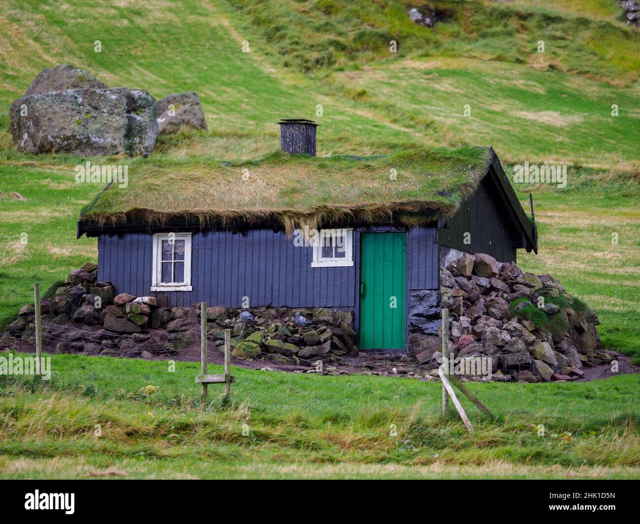 Typical turf-top house on the f Kalsoy Island. Faroe Islands, Denmark ...