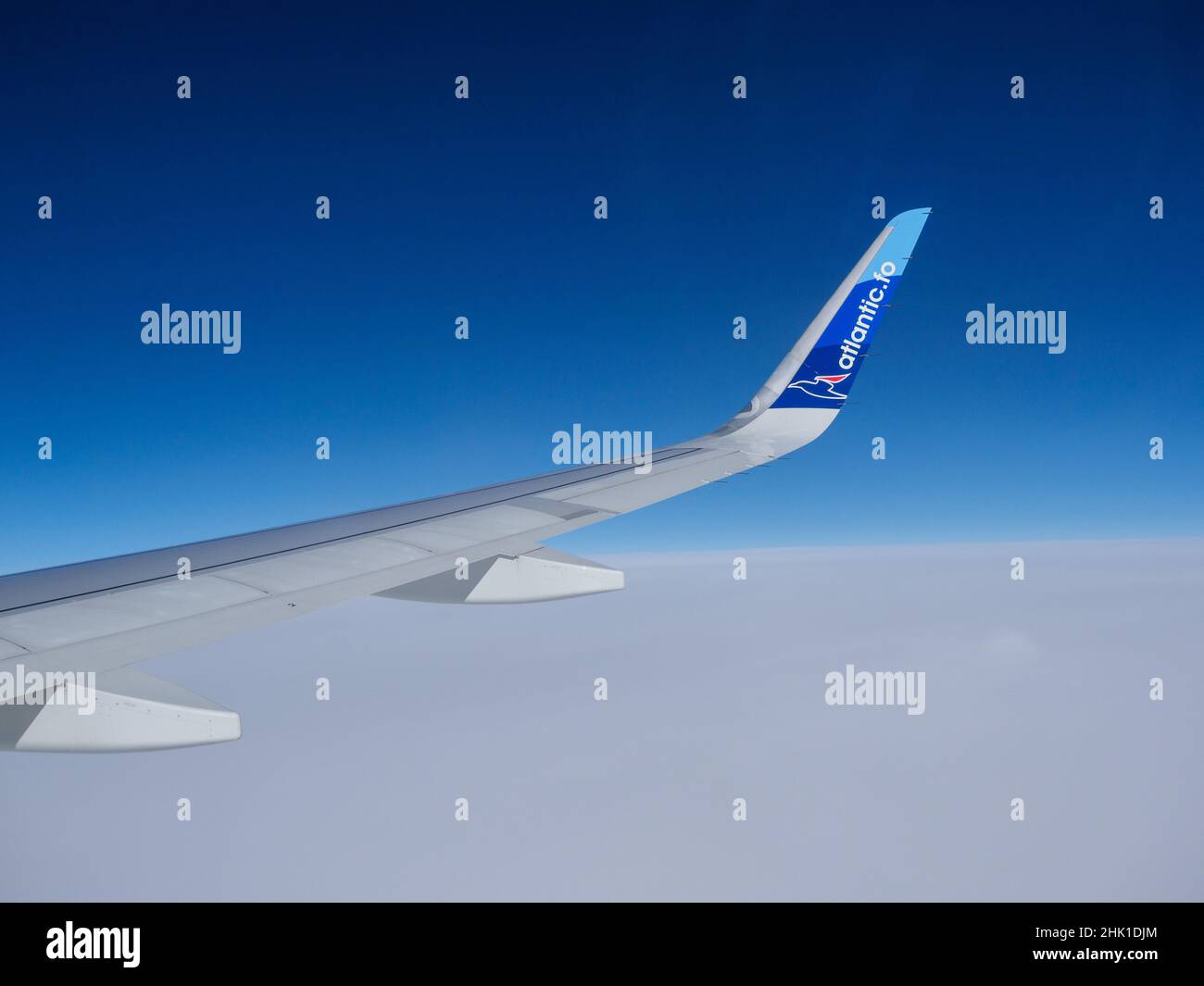 Denmark - Oct 2020: Wing of an Atlantic Airways jet on the background ...