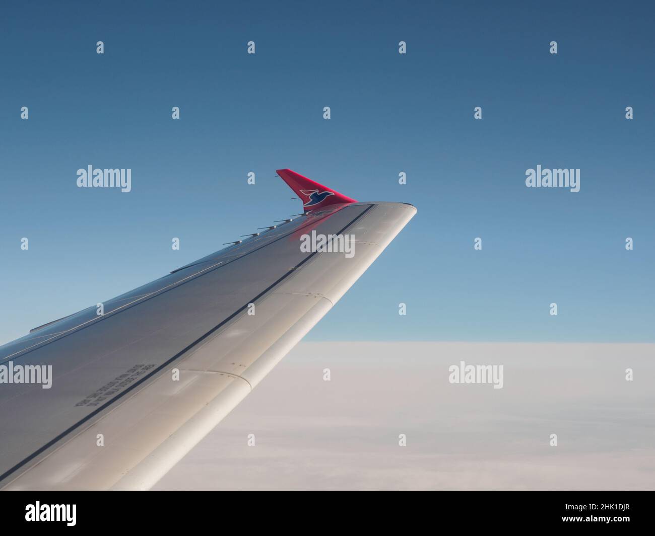 Denmark - Oct 2020: Wing of an Atlantic Airways jet on the background ...