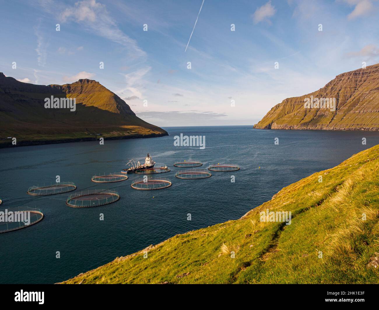 Faroe Islands, Denmark - Sep, 2020: Salmon farm, equipped with a ...