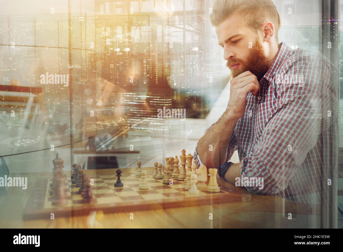 Businessmen play chess as strategy and tactic concept Stock Photo - Alamy