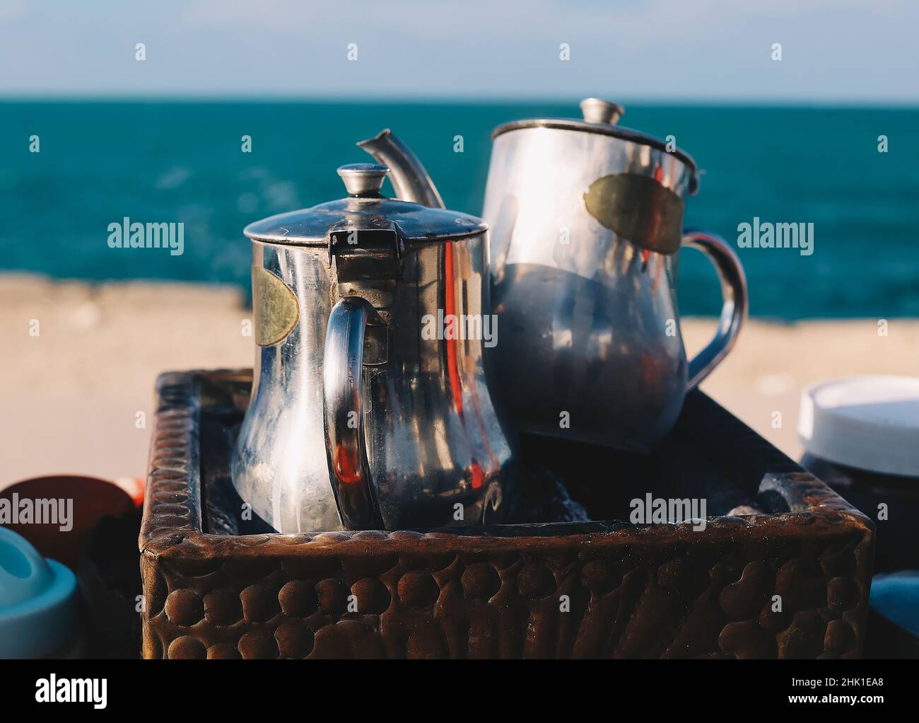 Outdoor cafe pots close up for making arabic turkish coffee at ...