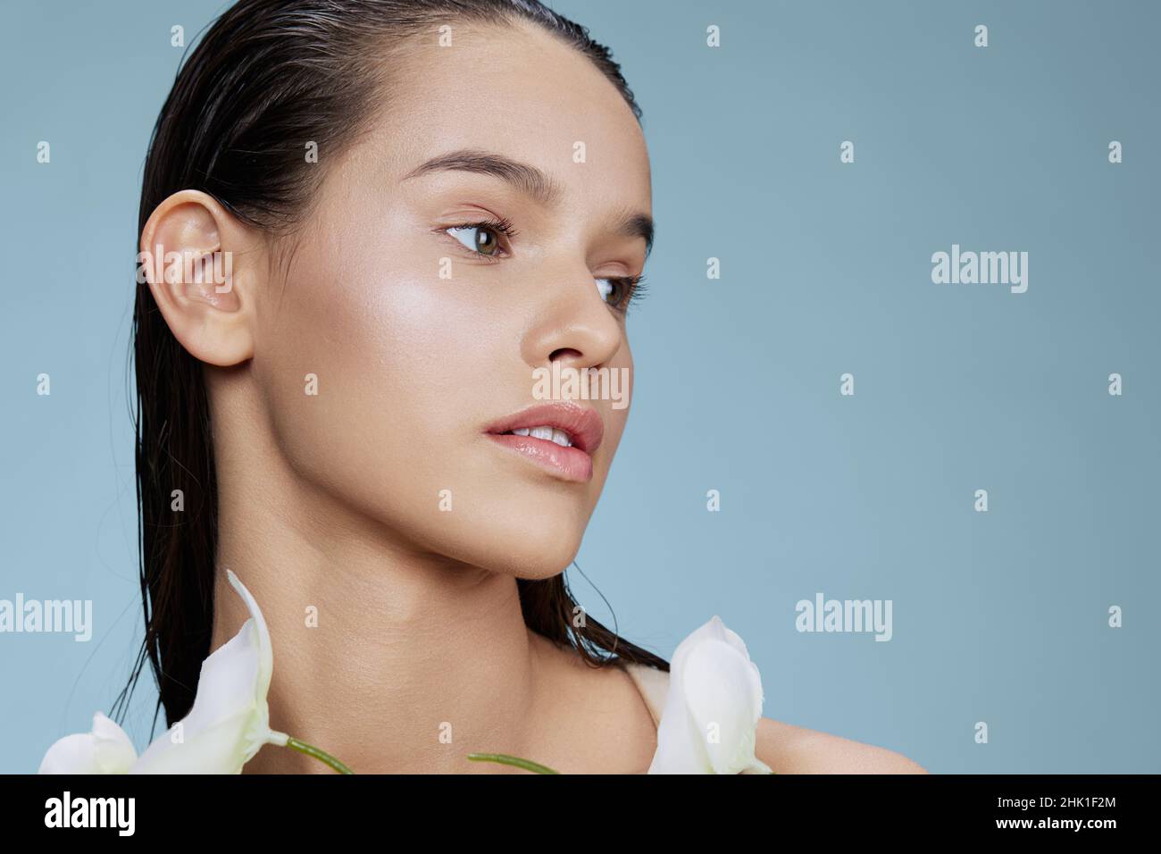 woman orchid near face cosmetics clean skin tenderness isolated ...