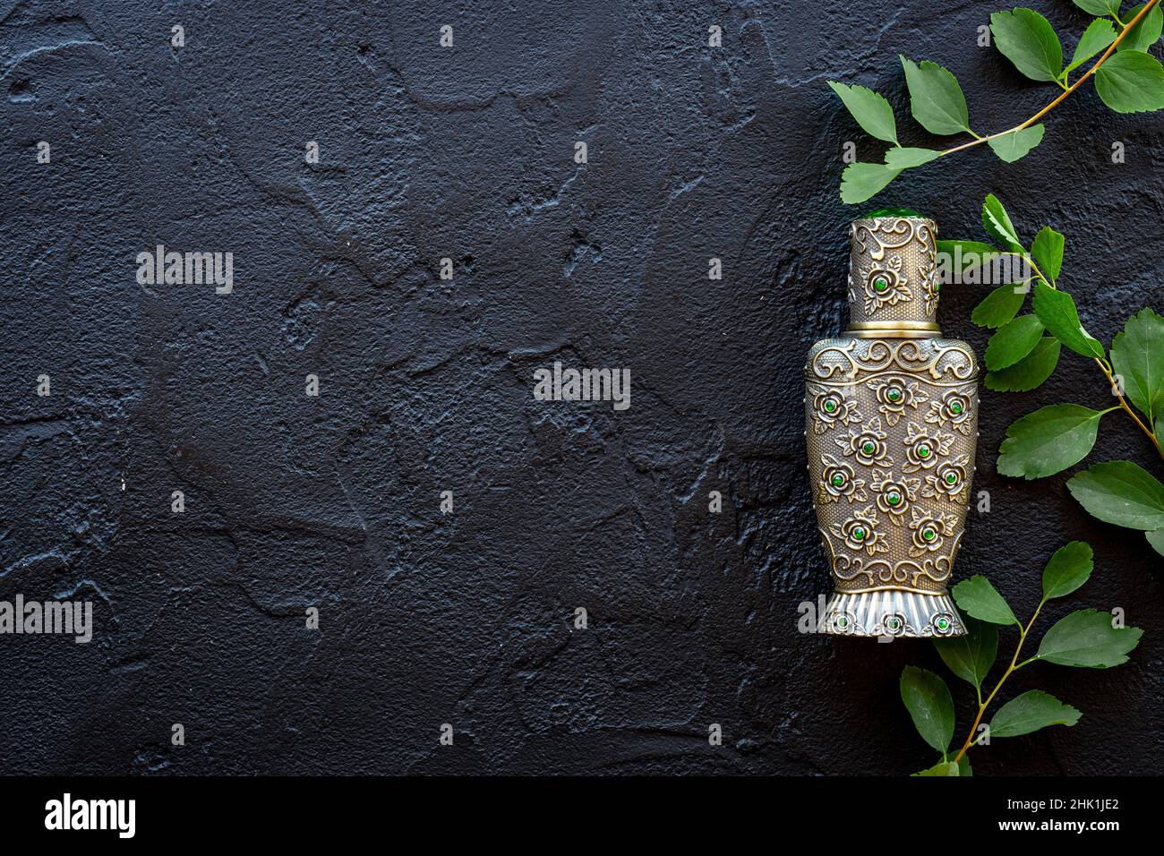 Arabian oud perfume or oil with agar wood tree Stock Photo - Alamy