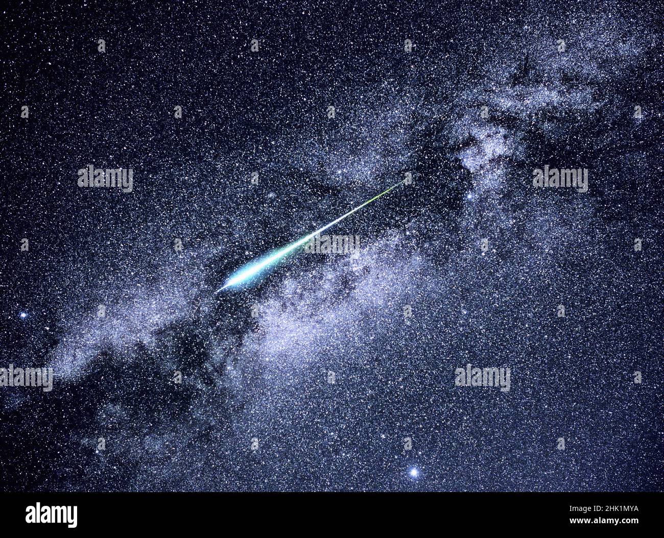 Shooting Star streaking across the Milky Way Stock Photo - Alamy