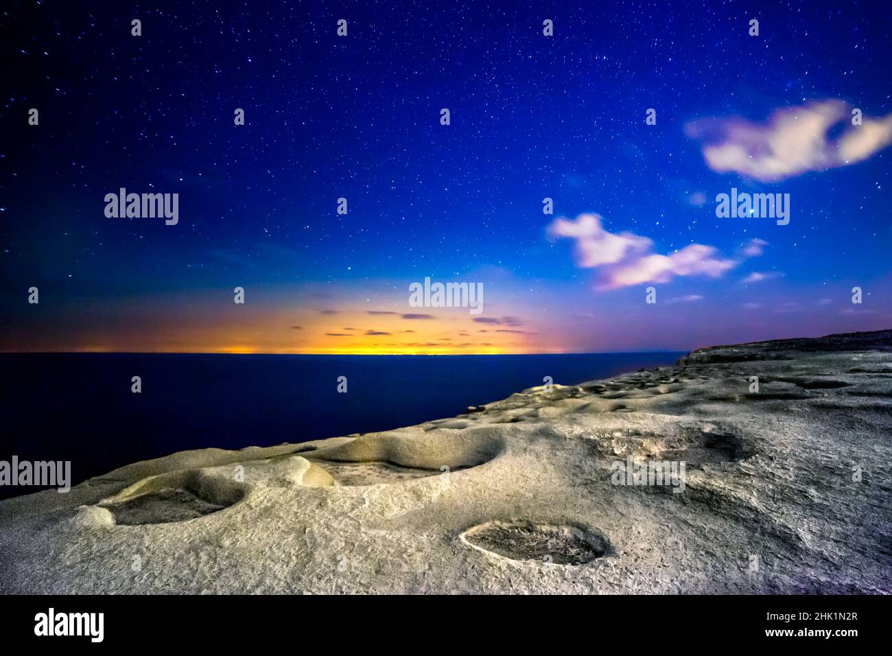 Gozo Cliffs with Sicily on the Horizon Stock Photo - Alamy