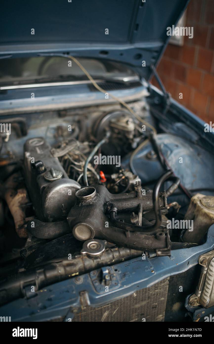 Dirty car engine details closeup Stock Photo - Alamy