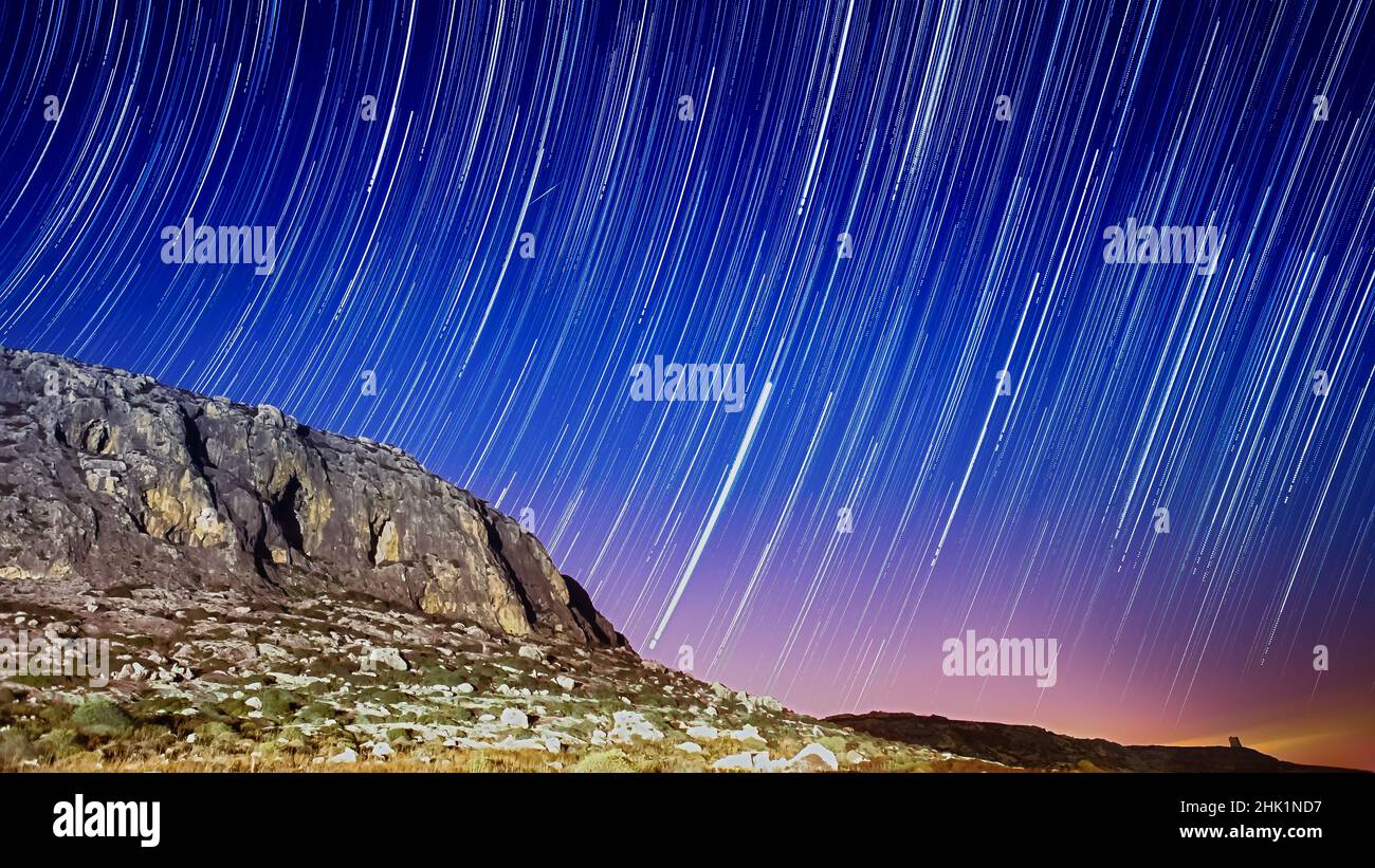 Star Trails over Ghar Lapsi Cliffs Stock Photo - Alamy