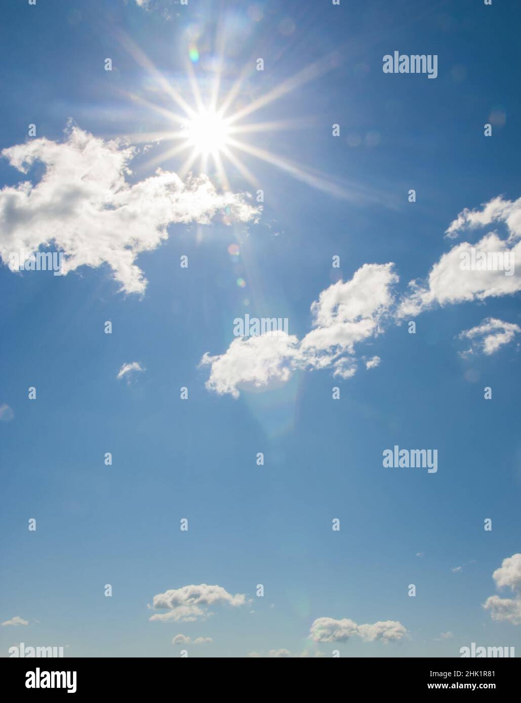 Blue sky, sun and sunlight. Majestic sky with sun and clouds in ...