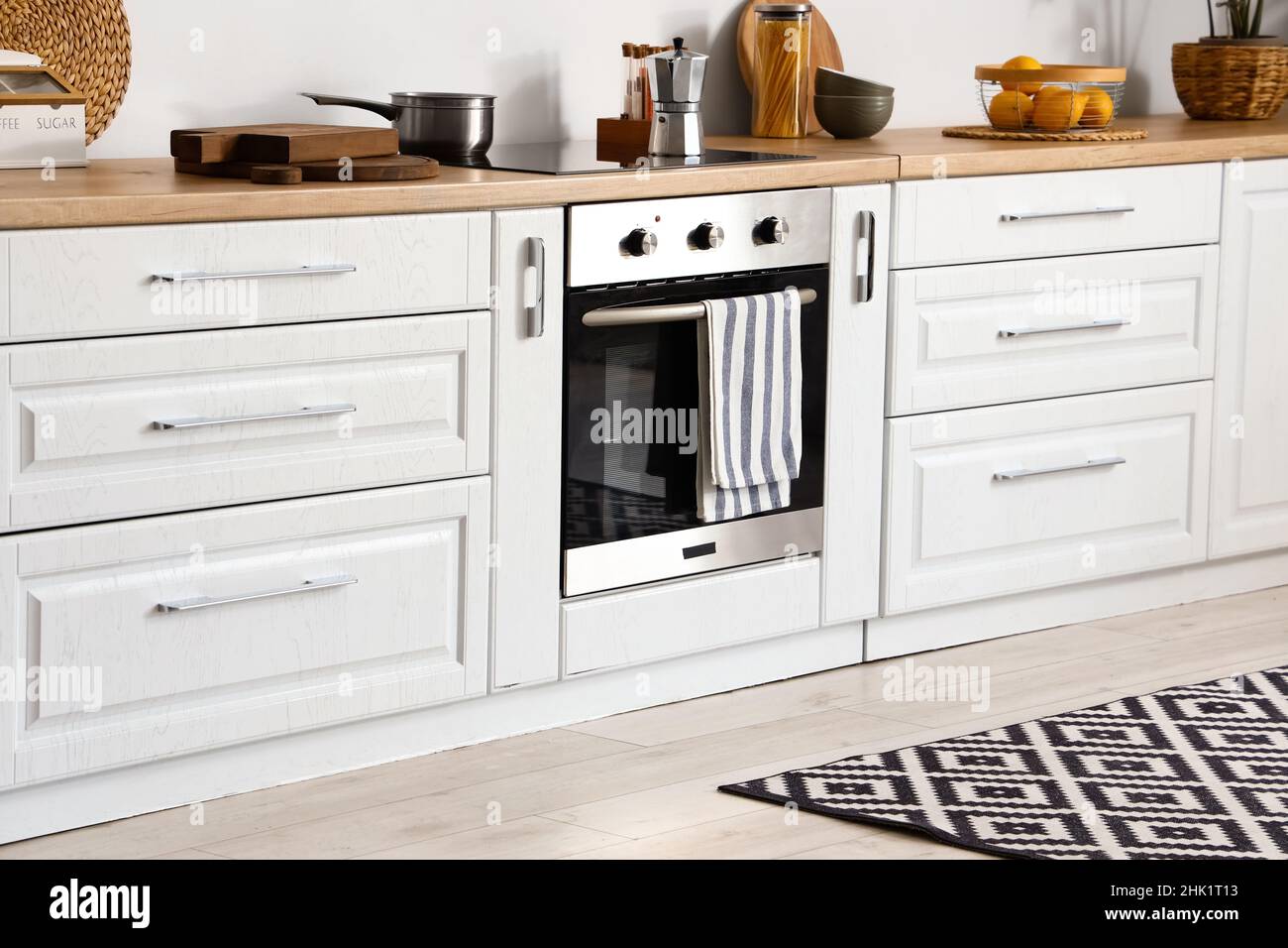 Modern counters with drawers in kitchen interior Stock Photo - Alamy