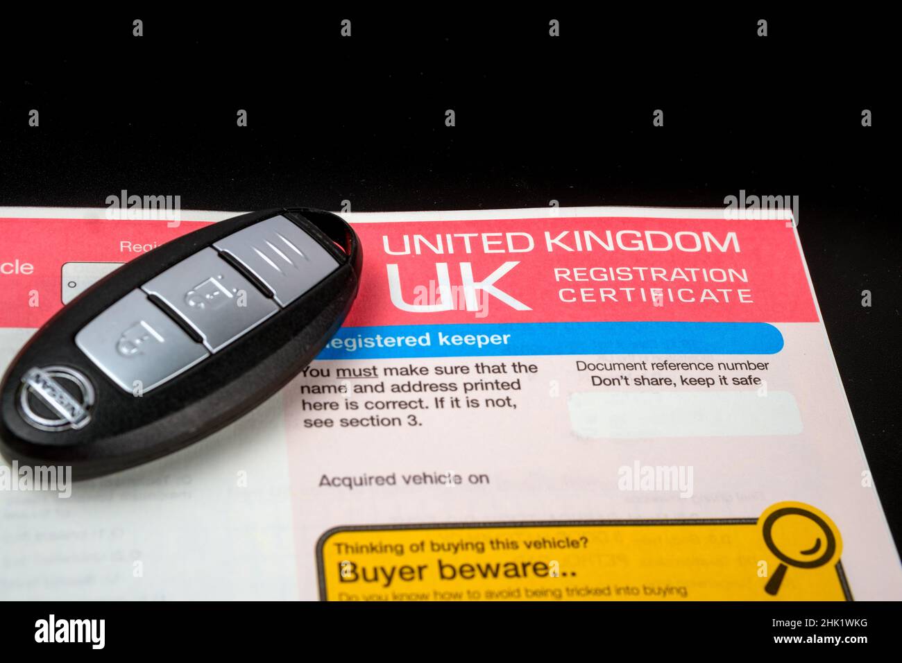 Genuine UK registration certificate for a purchased car seen on photo. Registration document ...
