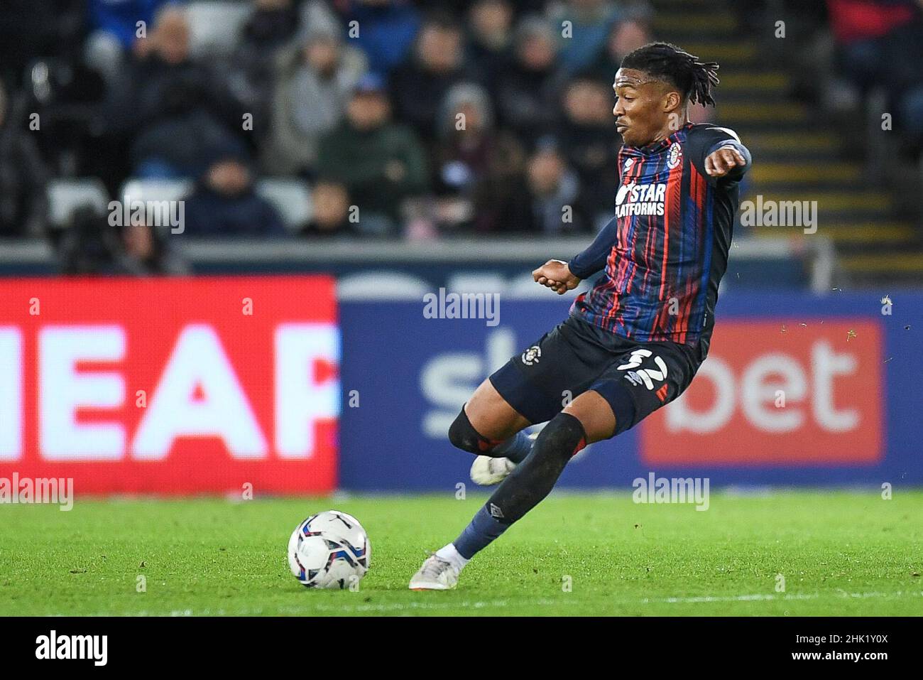Gabriel Osho #32 of Luton Town in action during the game Stock Photo ...