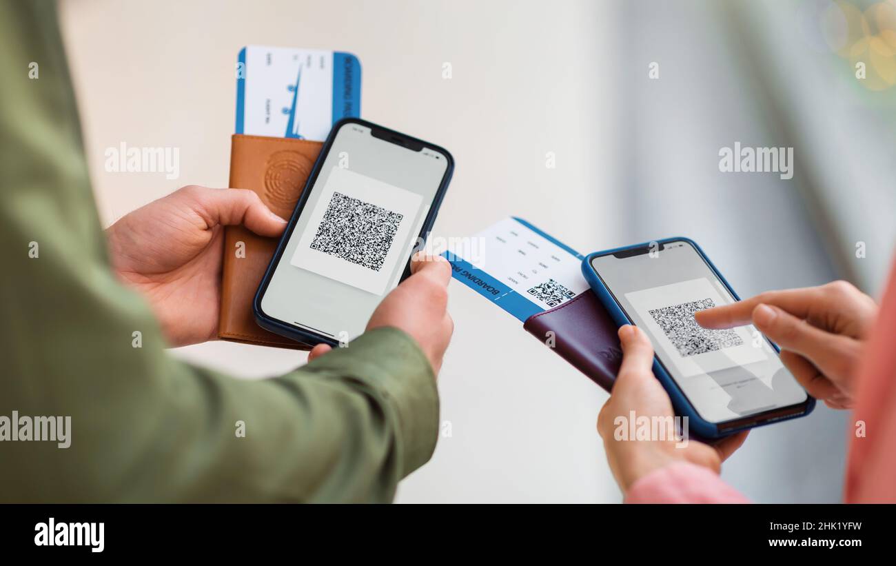Tourists Holding Smartphones With Covid Certificate QR Code Indoor ...