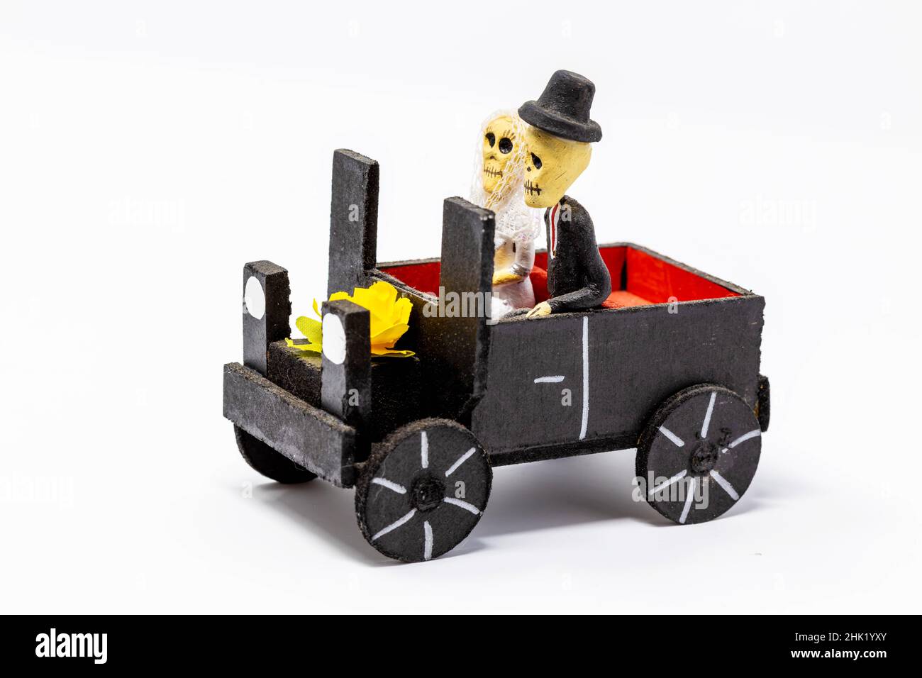 Traditional mexican dead couple riding a car on Day of the Dead ...