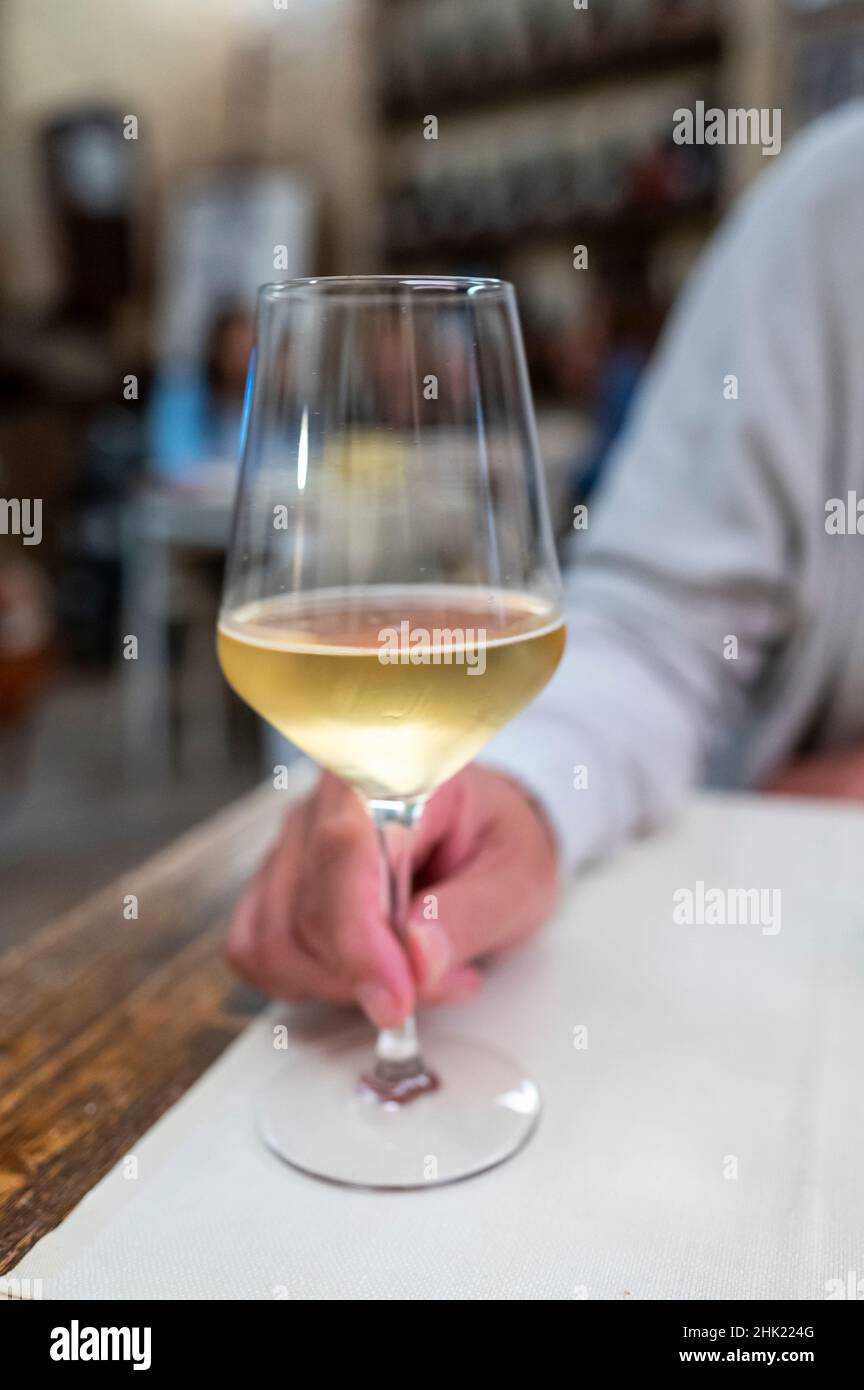 Dinner with sweet cold muscat white desert wine in traditional Italian ...