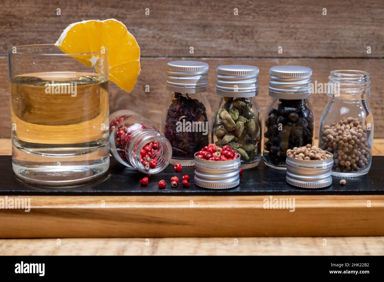 Professional set of gin spices in small bottles, pink pepper, hibiscus ...
