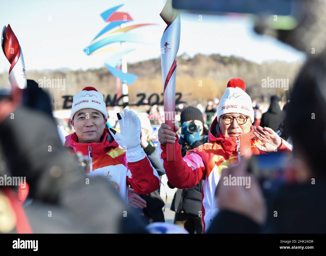 Beijing, China. 2nd Feb, 2022. Torch bearers Luo Zhihuan (R) and Jing ...