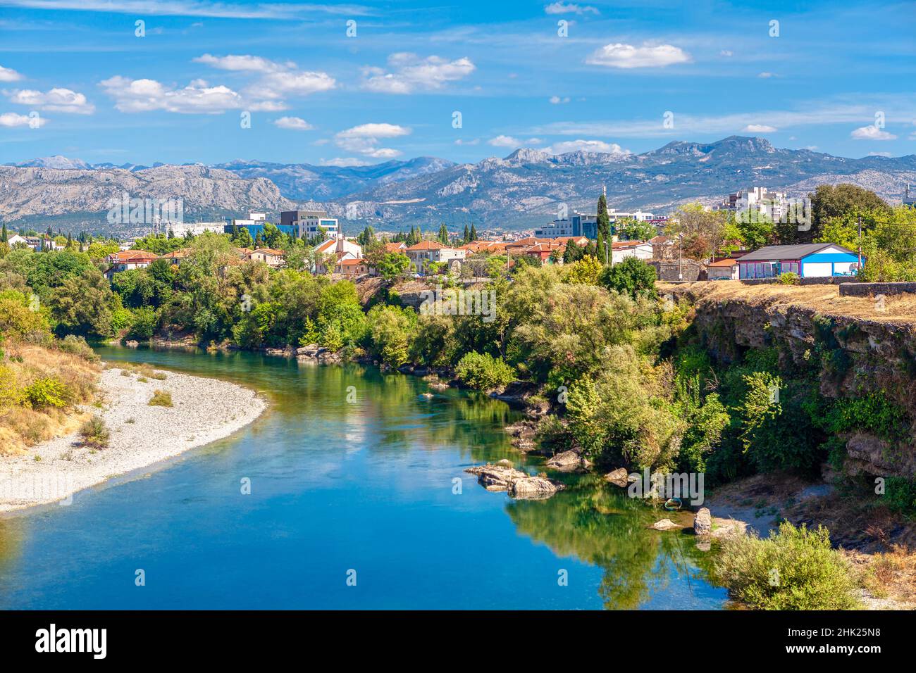 Podgorica city at Moraca riverside . Landscape with Balkans and river ...