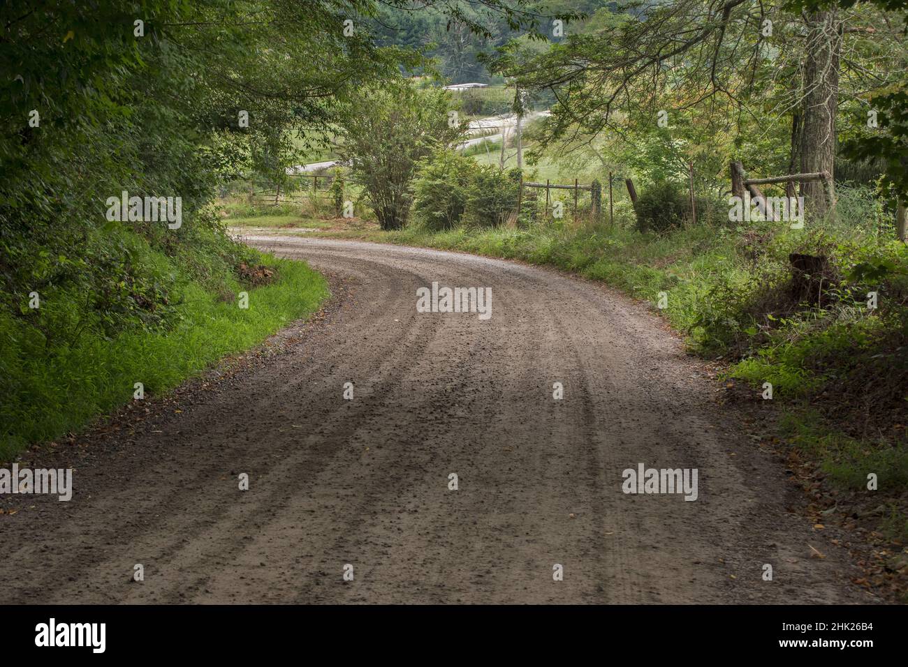 Curve, isolated dirt road in a rural area of Southwest, Virginia Stock ...