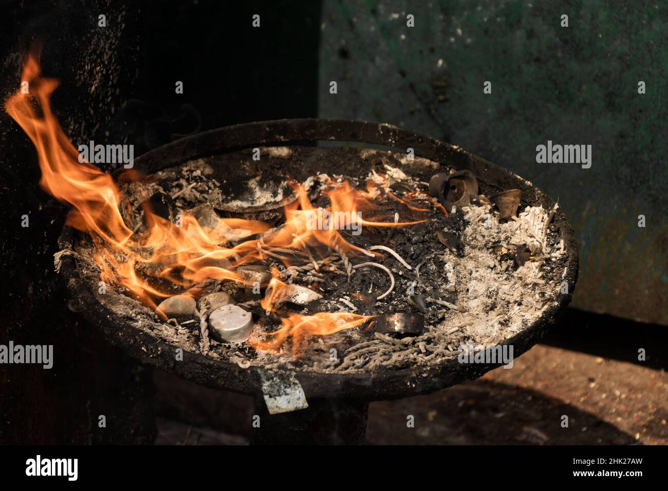 The fire is ignited by the devotees to pray and worship for their gods ...