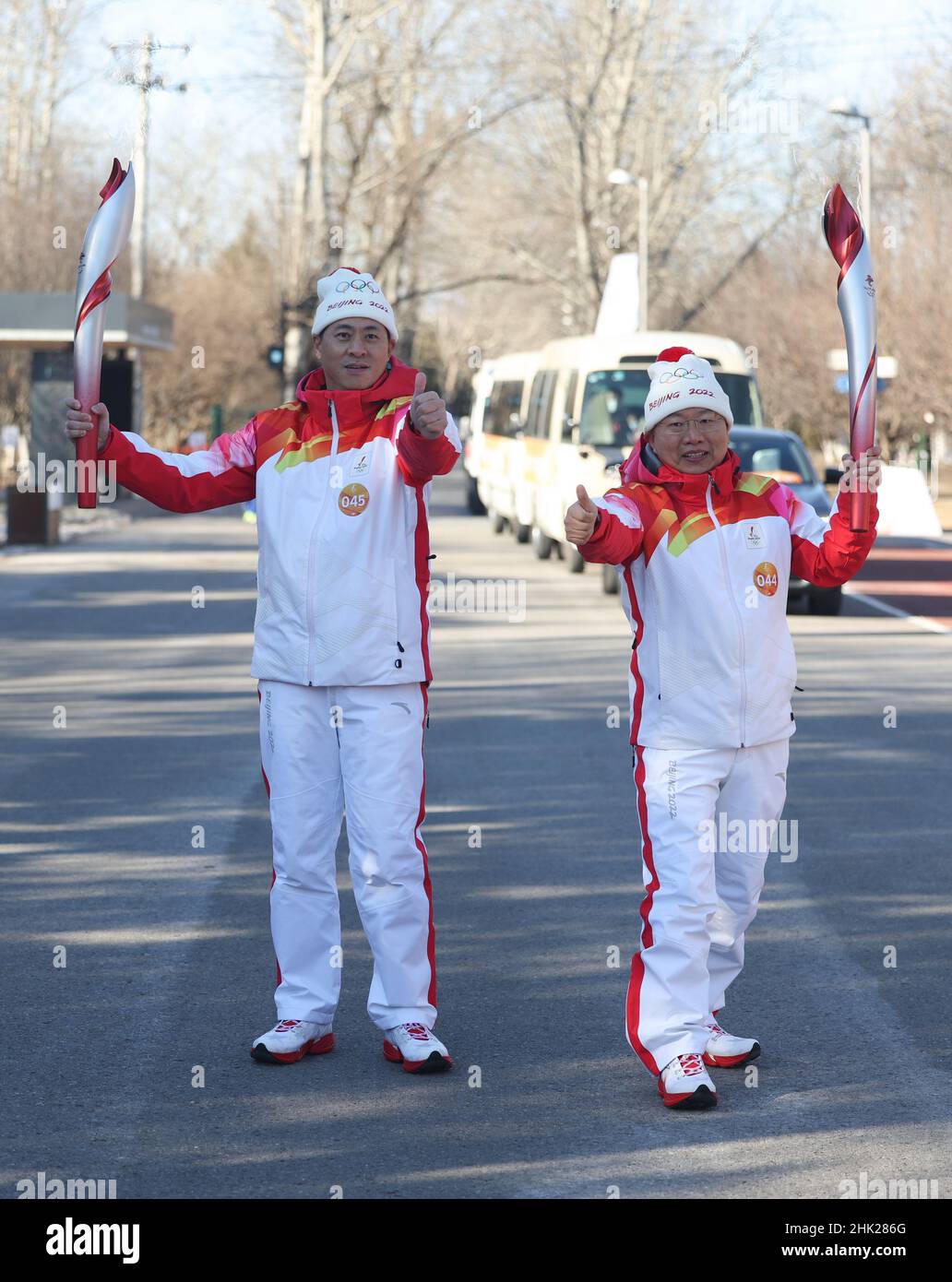 Beijing, China. 2nd Feb, 2022. Torch bearers Pei Minshan (L) and Zhuo ...