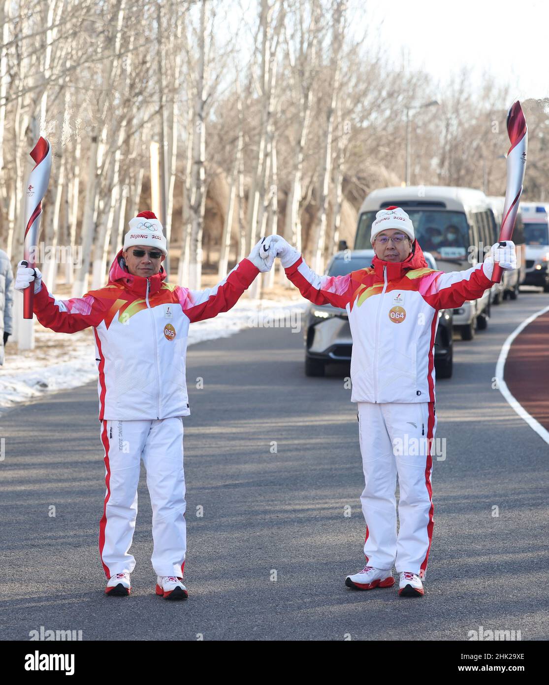 Beijing, China. 2nd Feb, 2022. Torch bearers Bi Mingwei (R) and Yao ...