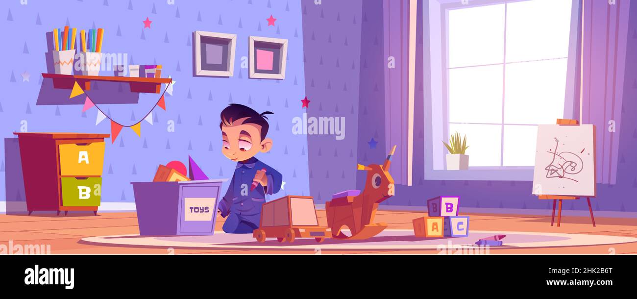 Child playing in room, little boy sit on floor with pencil in hand ...