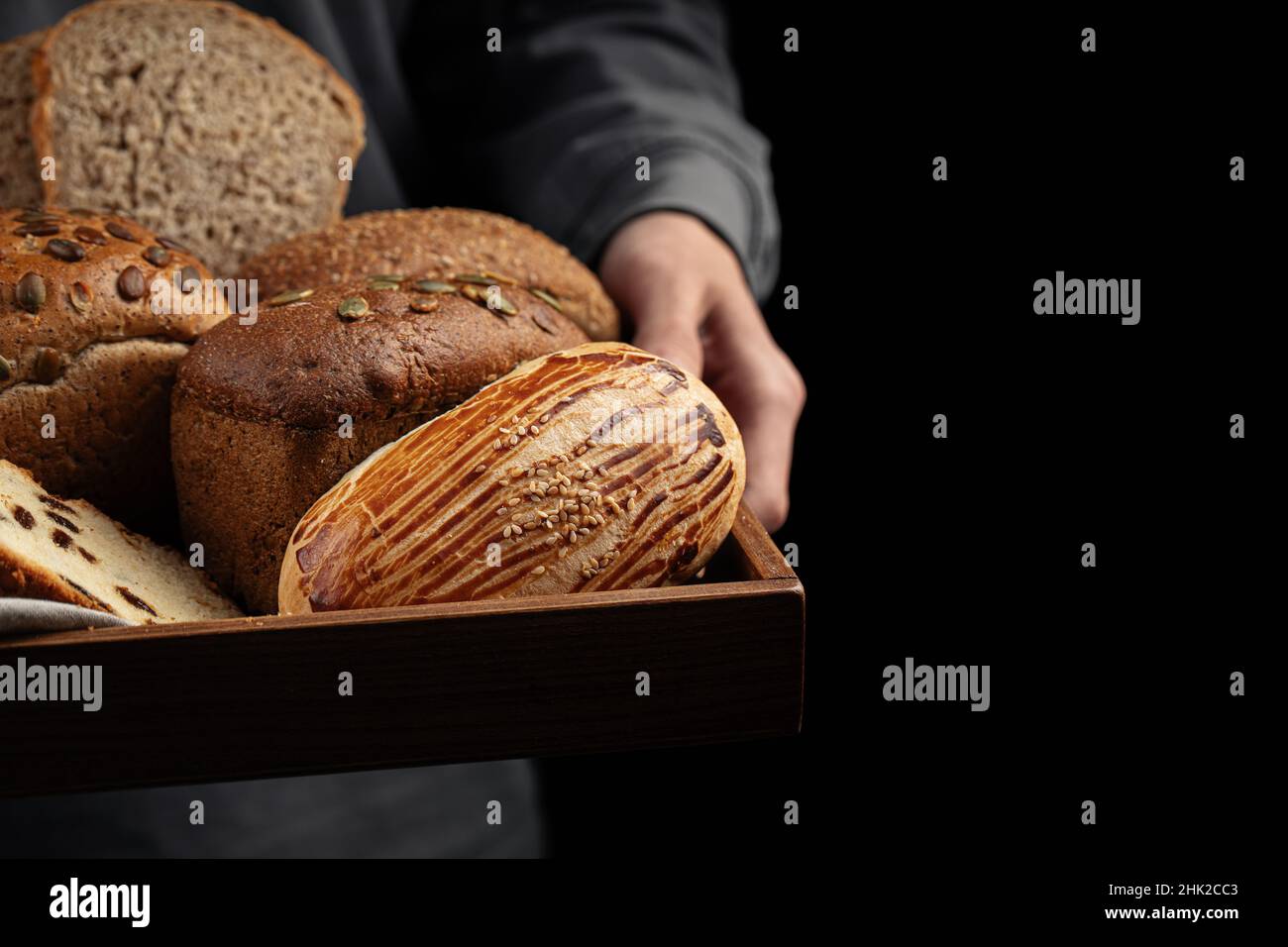 Hands holding food tray hi-res stock photography and images - Alamy