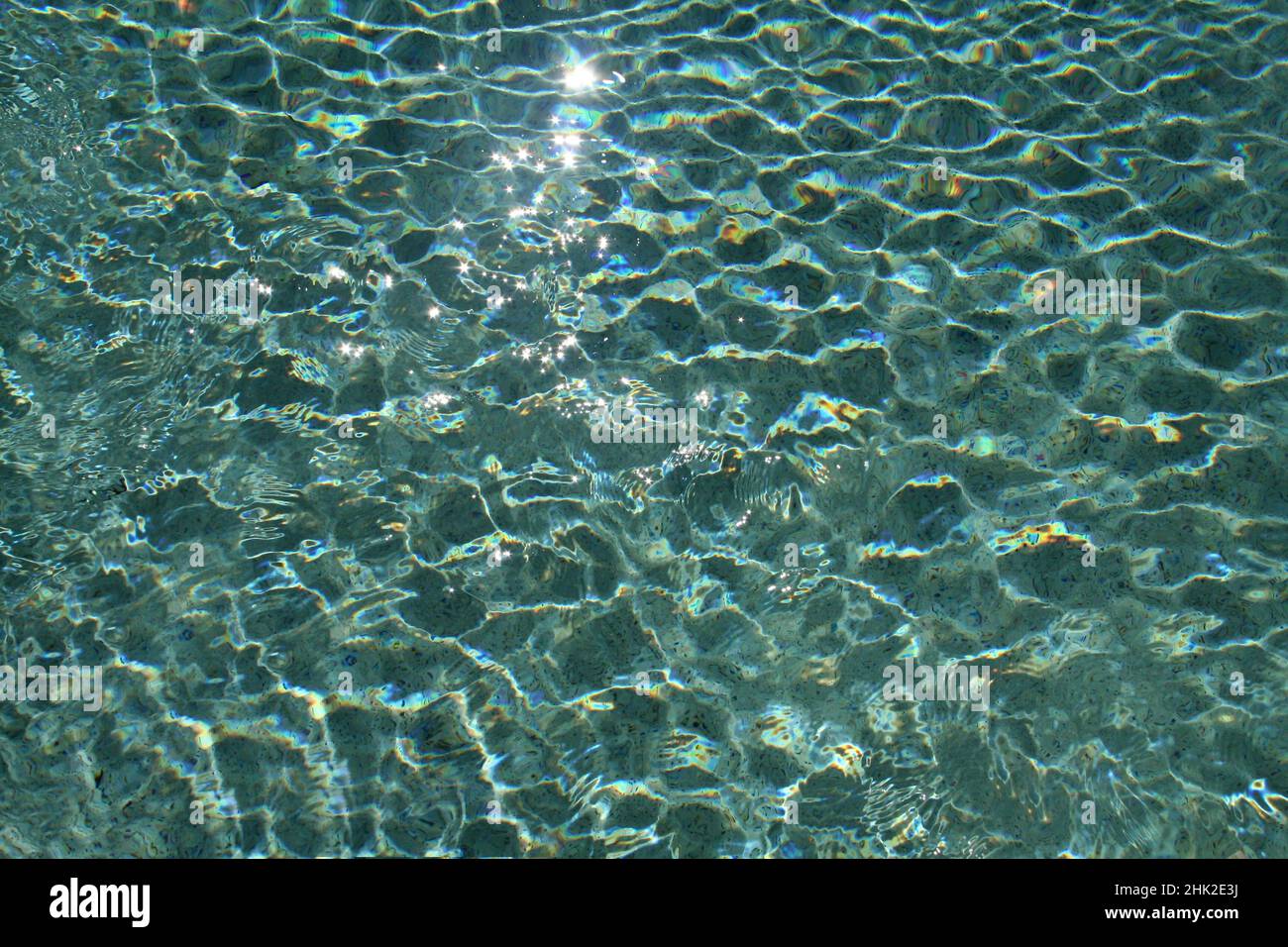 Crystal clear teal water in the pool for wallpaper and background Stock ...