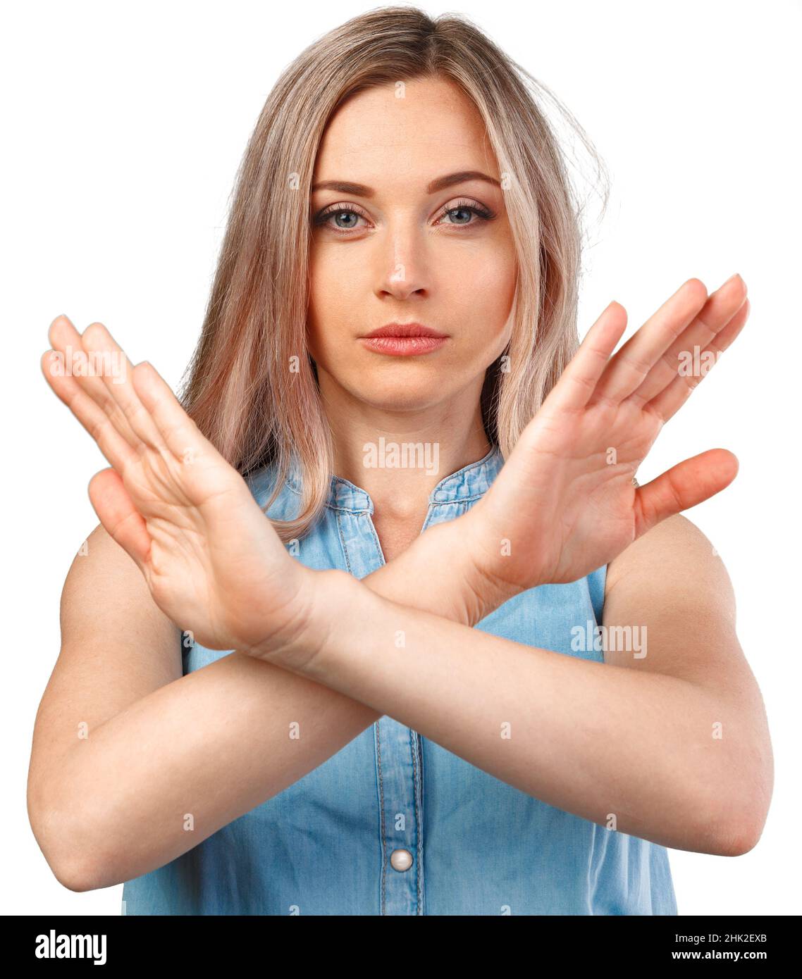 Young woman showing two hands stop gesture isolated on white background ...
