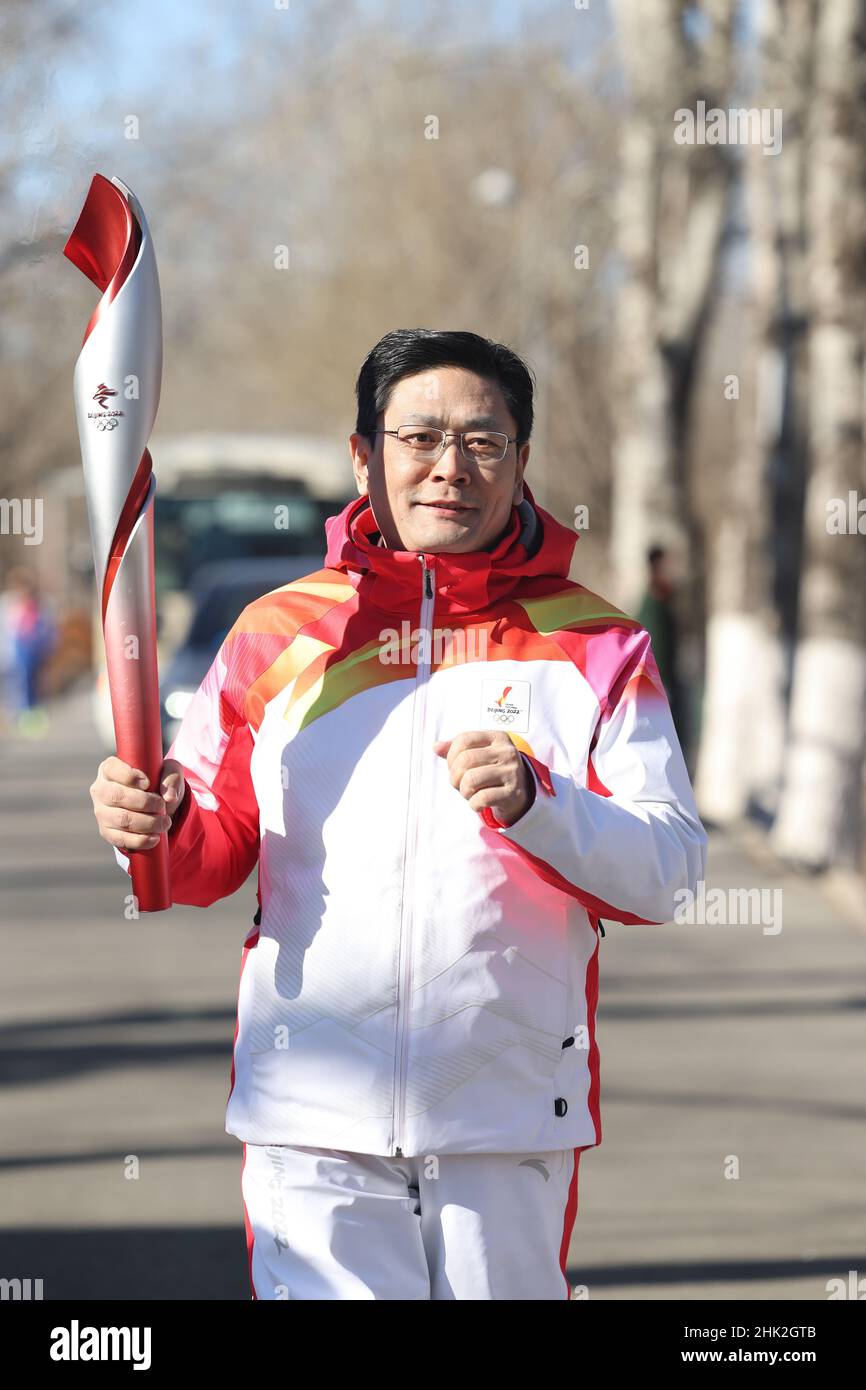 Beijing, China. 2nd Feb, 2022. Torch bearer Wei Shiling runs with the ...