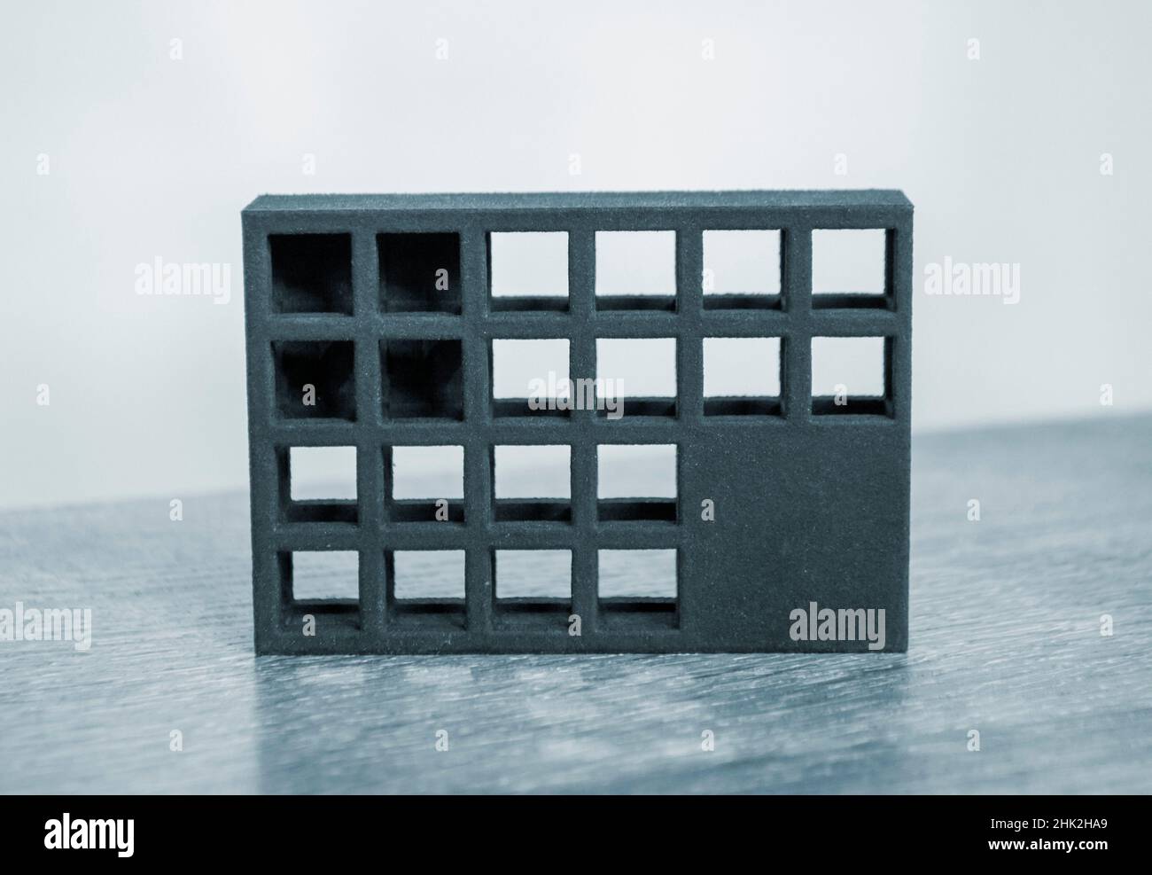 Black abstract model object printed on 3d printer from powder close-up ...