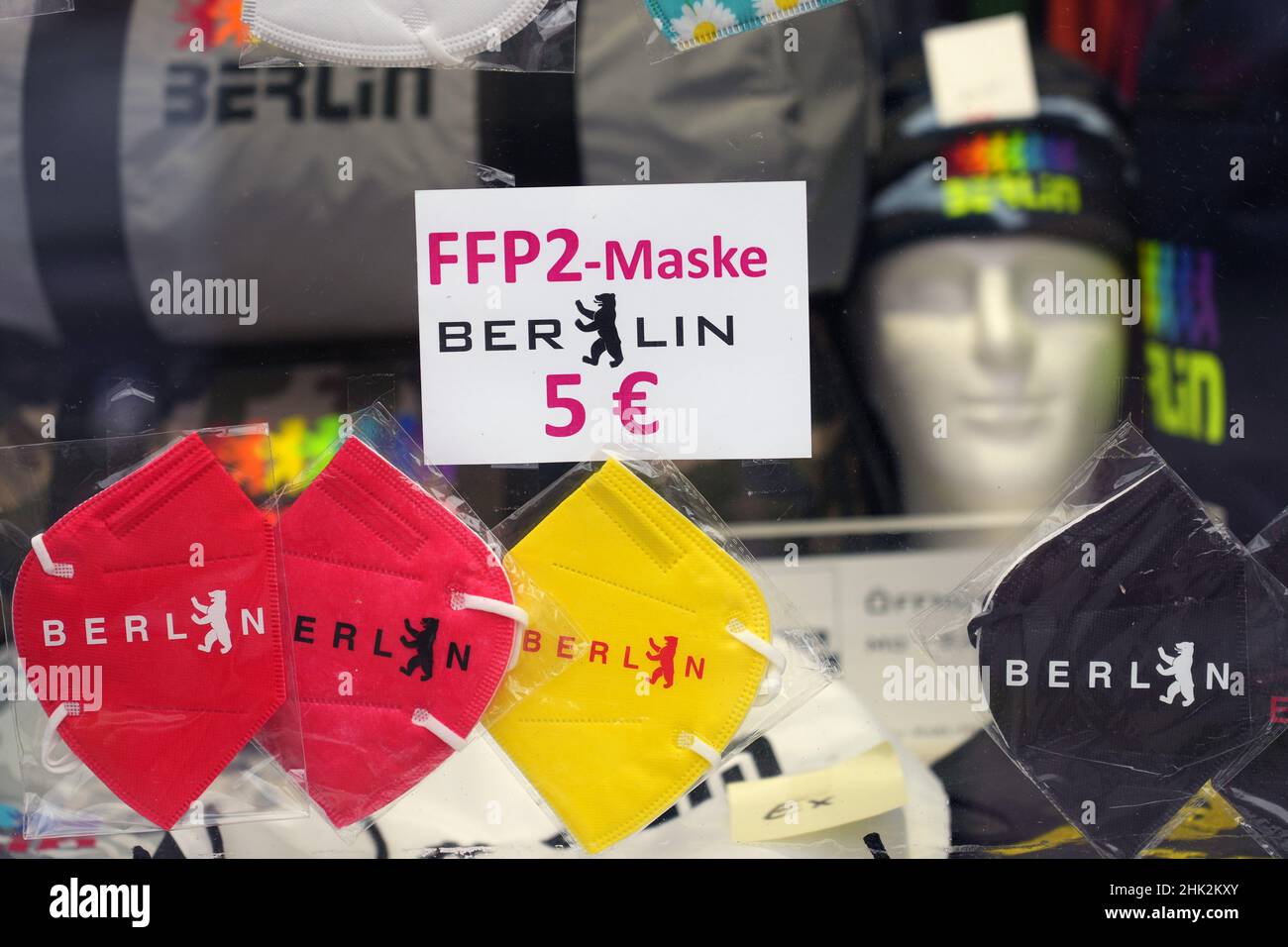 Berlin, Germany. 01st Feb, 2022. A sign "FFP2 mask Berlin 5 Euro" hangs ...