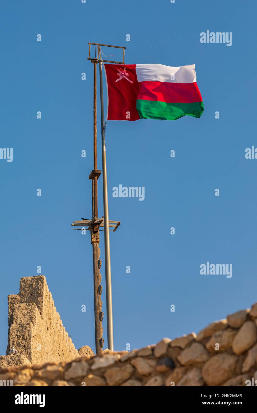 Middle East, Arabian Peninsula, Oman, Muscat, Muttrah. Omani flag ...