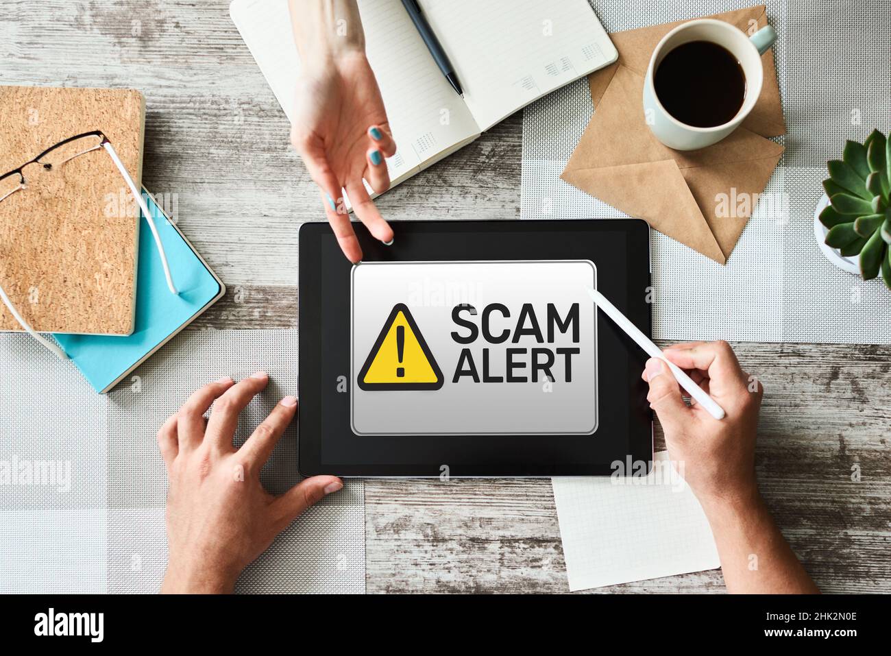 Scam alert detecting warning. Notification on device screen Stock Photo ...
