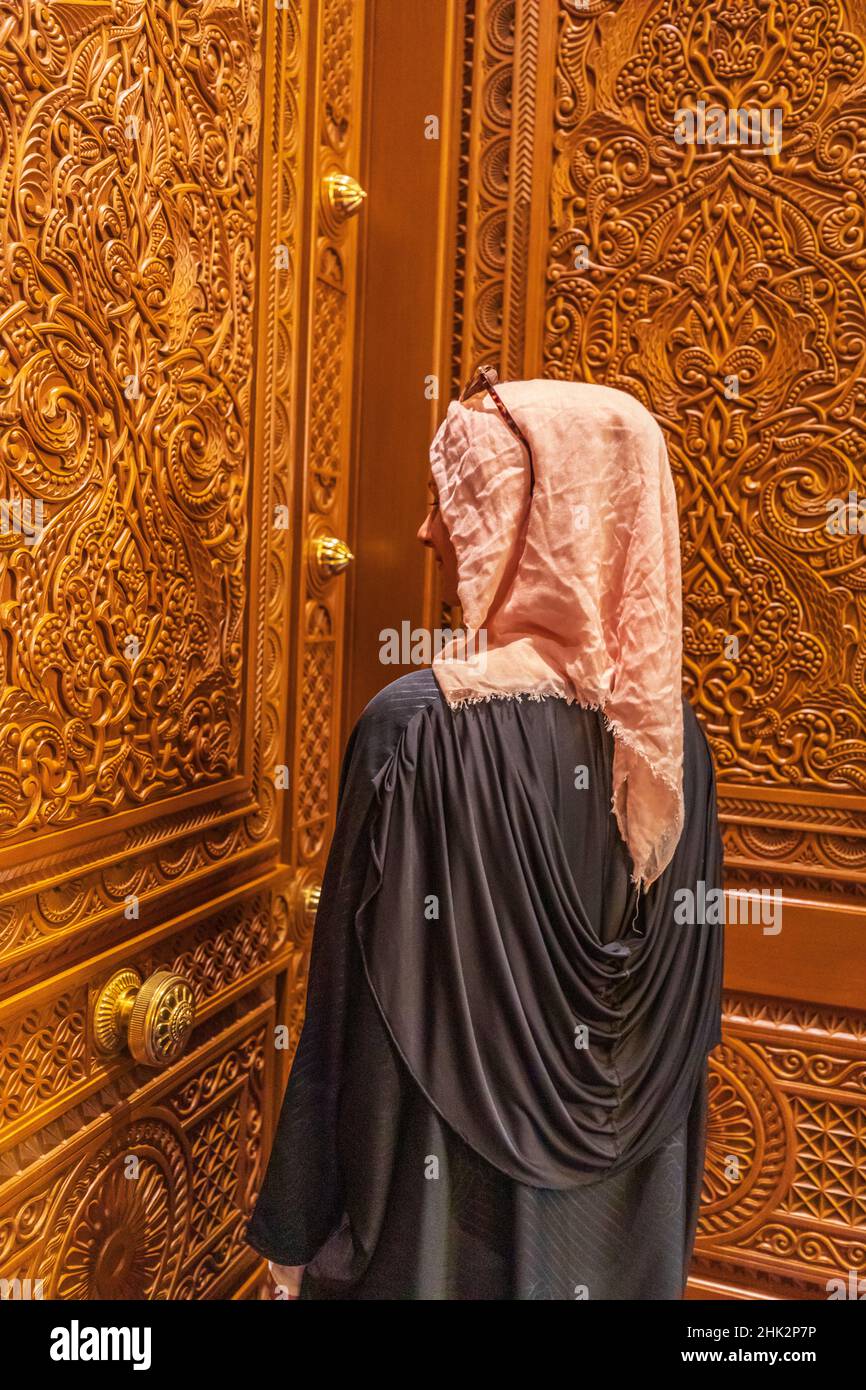 Middle East, Arabian Peninsula, Oman, Muscat. Woman in the Sultan ...