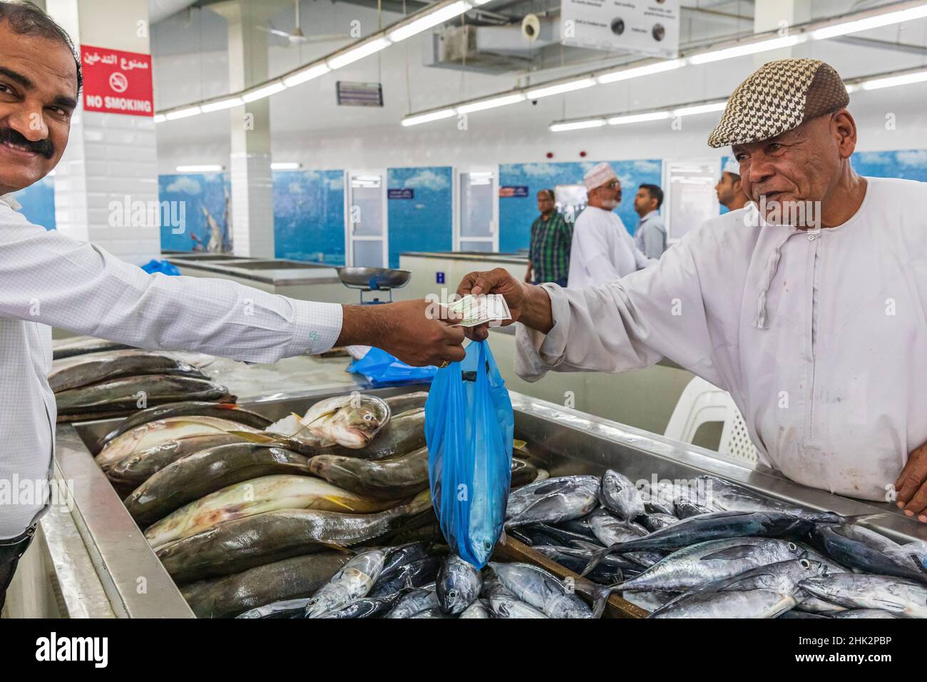 Middle East, Arabian Peninsula, Oman, Muscat, Muttrah. Vendor selling ...