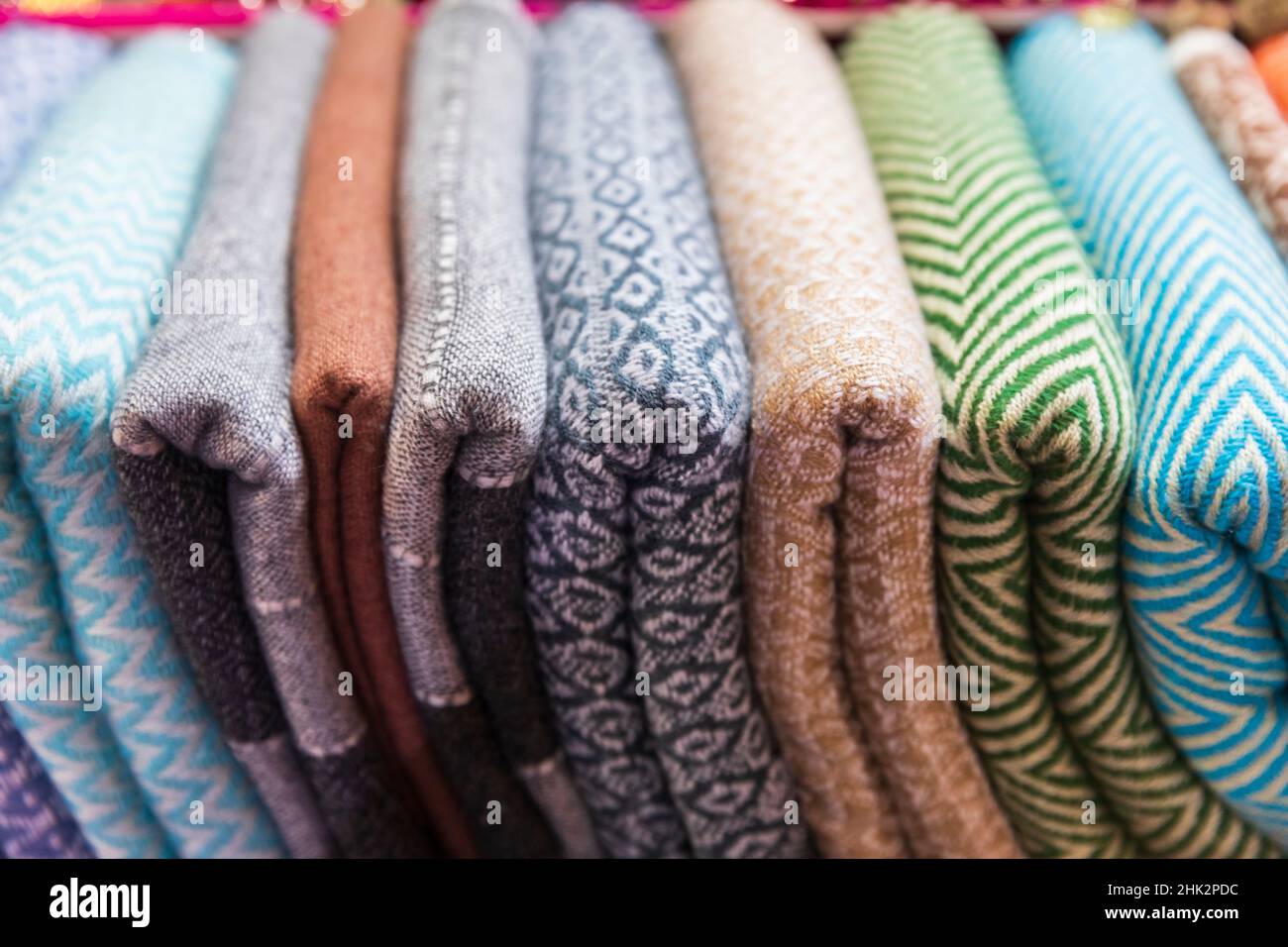 Middle East, Arabian Peninsula, Oman, Muscat, Muttrah. Bolts of cloth ...