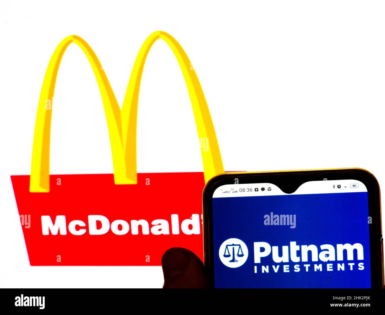 In this photo illustration, the Putnam LLC logo is displayed on a ...